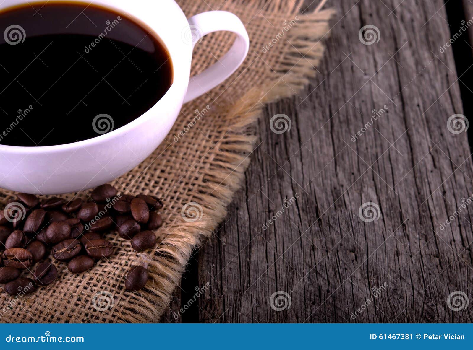 Coffee cup on a wood table stock image. Image of aroma - 61467381