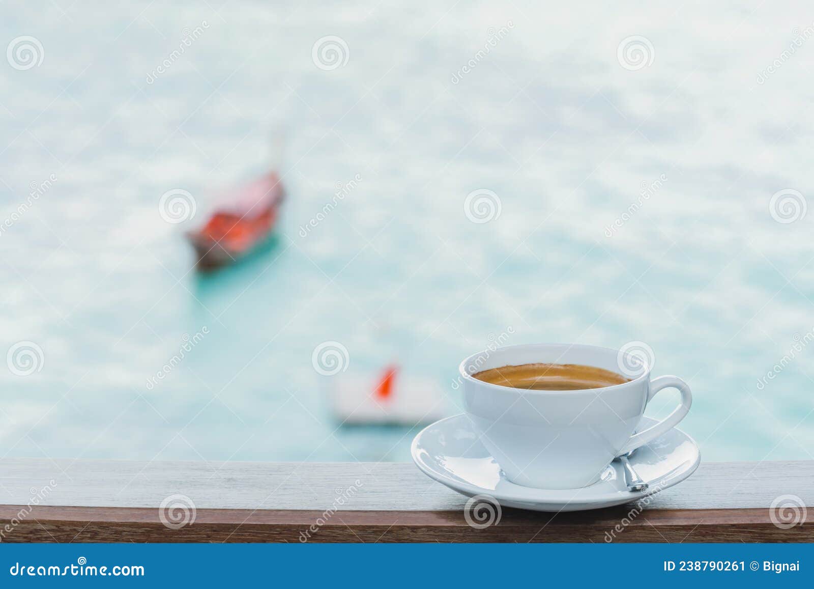 Coffee Cup on Wooden Top with Ocean View in Background. Stock Image ...