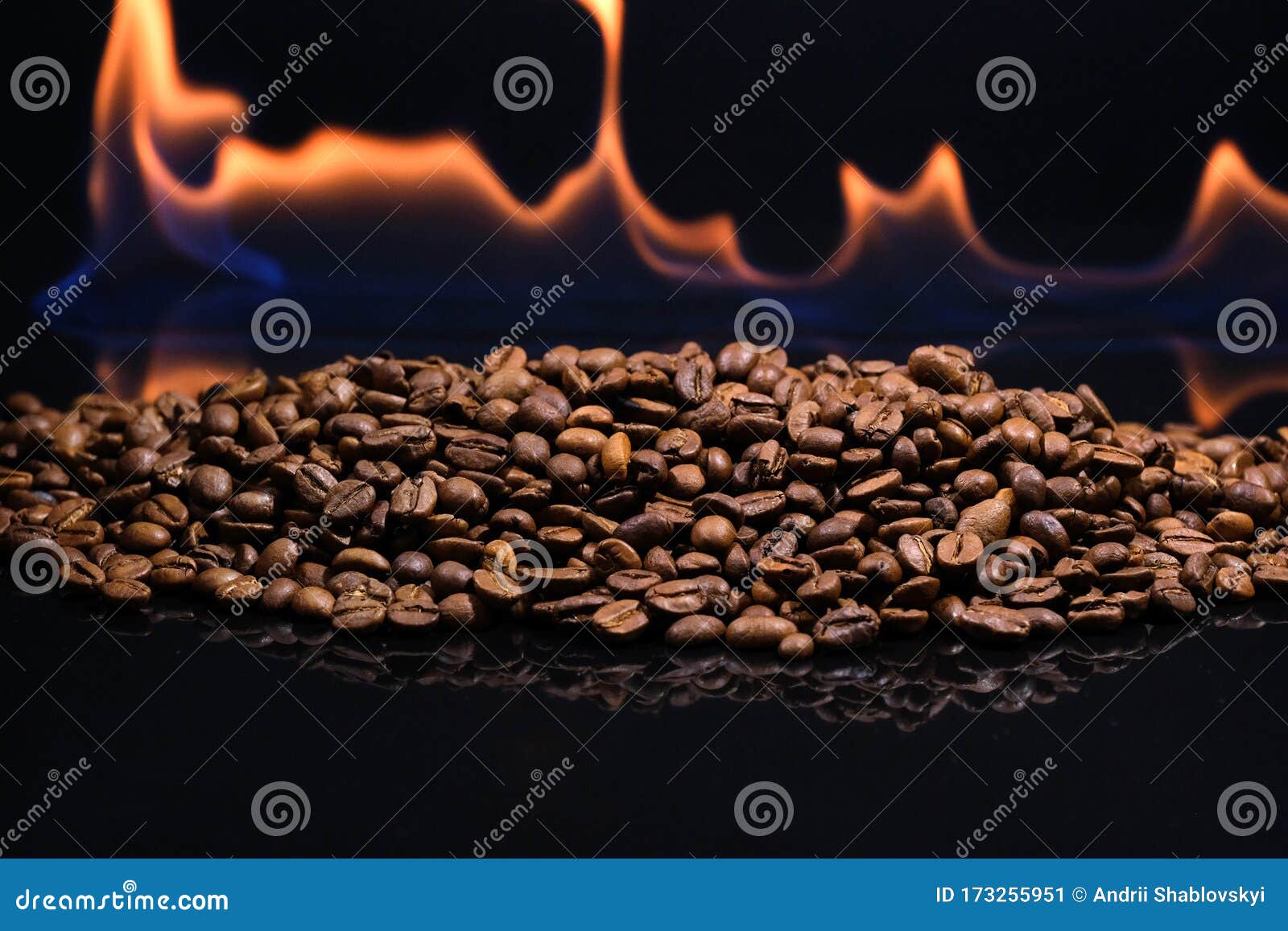 Coffee on Fire on a Black Background with Reflection. Coffee Roasted ...