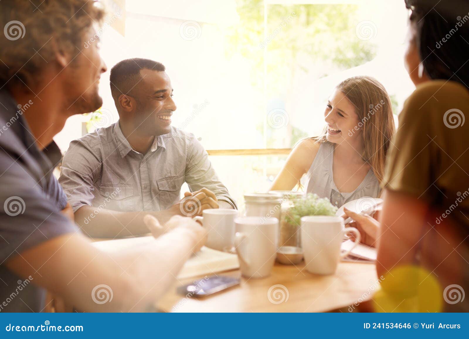 Coffee and Friends. Shot of a Group of Friends Talking in a Cafe. Stock ...