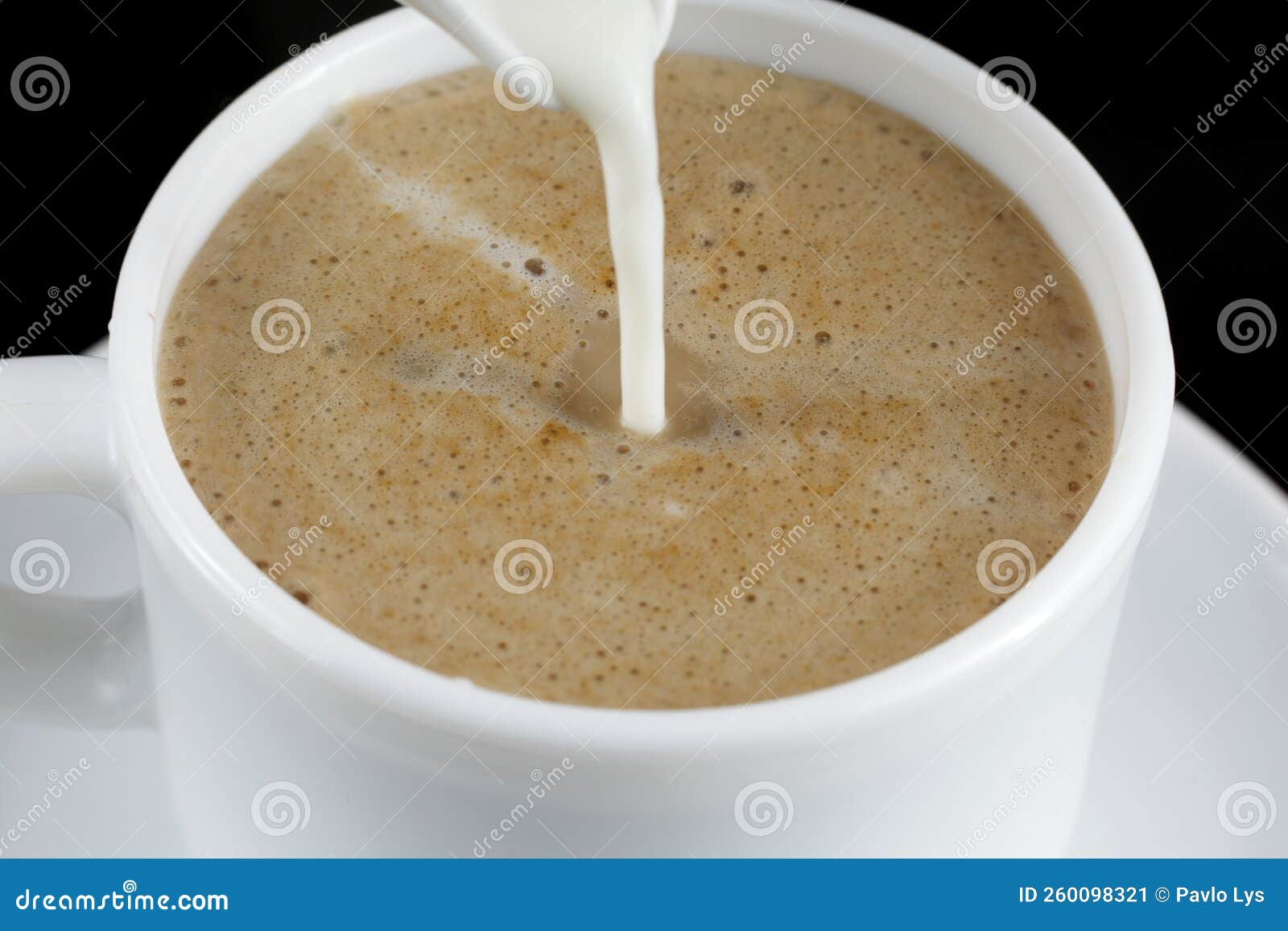 Coffee with Milk. Milk is Poured into a Cup with Coffee Stock Image ...