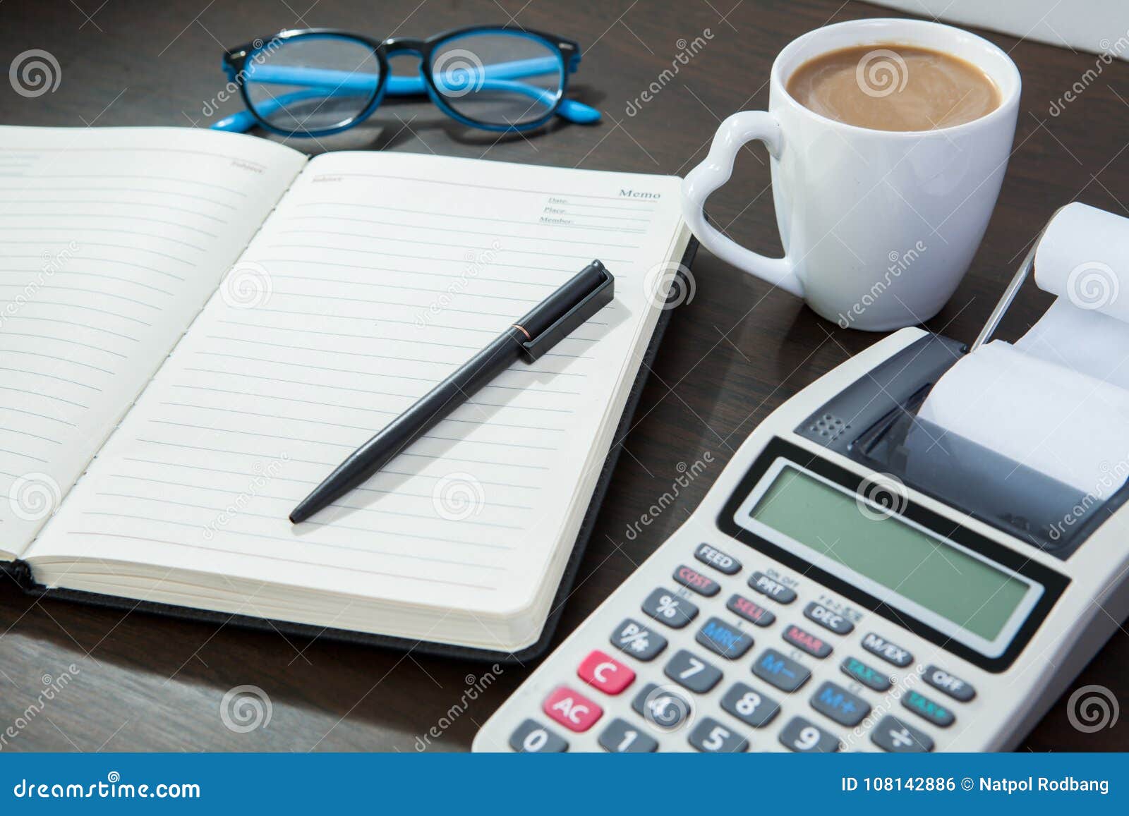 Coffee Notepad with Pen and Calculator Glasses on Work Table. Stock ...