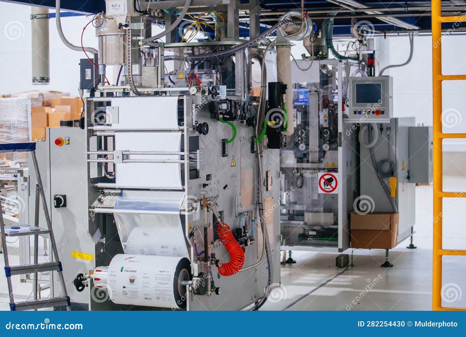 Coffee Packaging, Bagging and Stacking Machine Editorial Image - Image ...