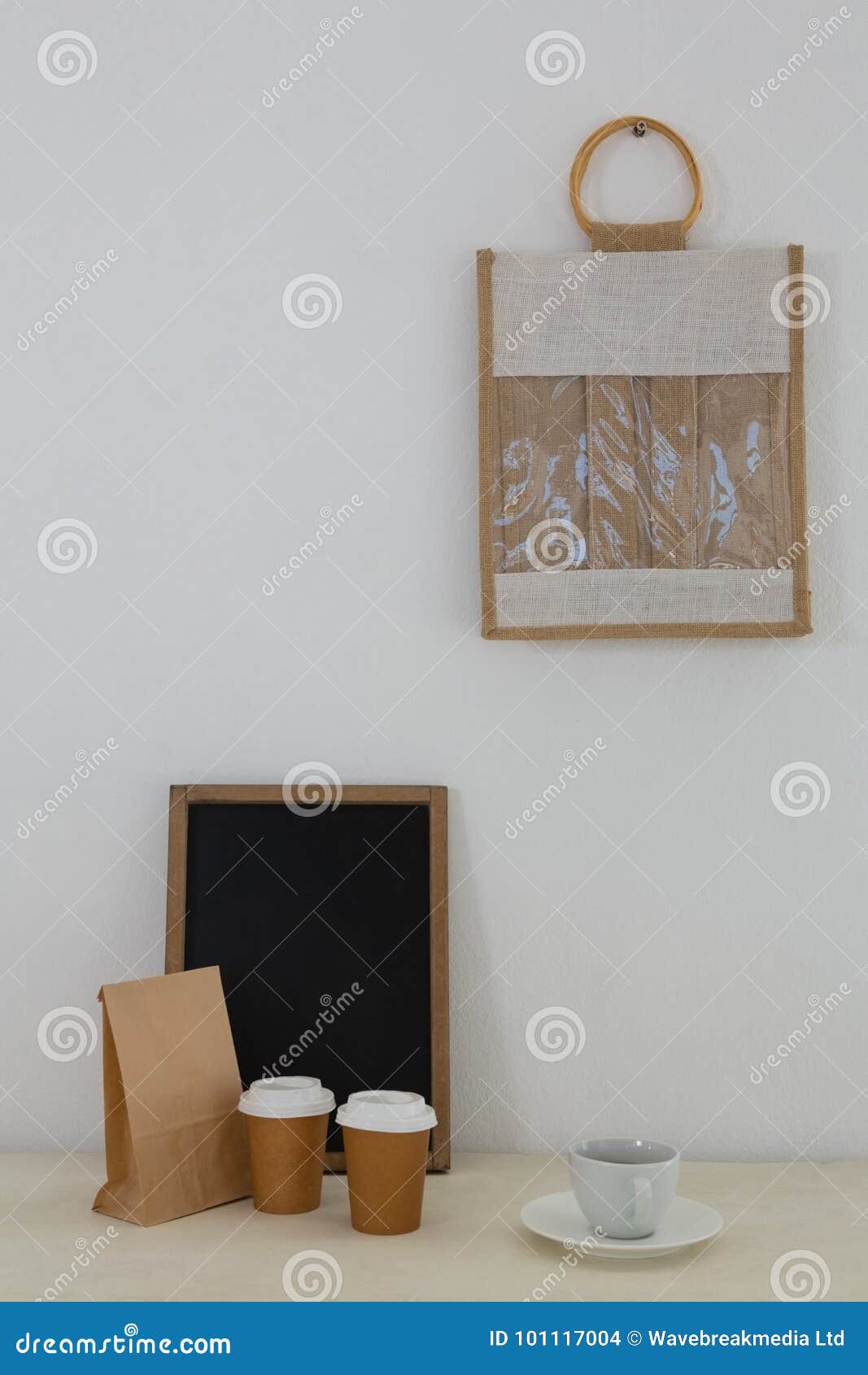 Coffee, Parcel, Slate and Bag Against Wall Stock Photo - Image of ...