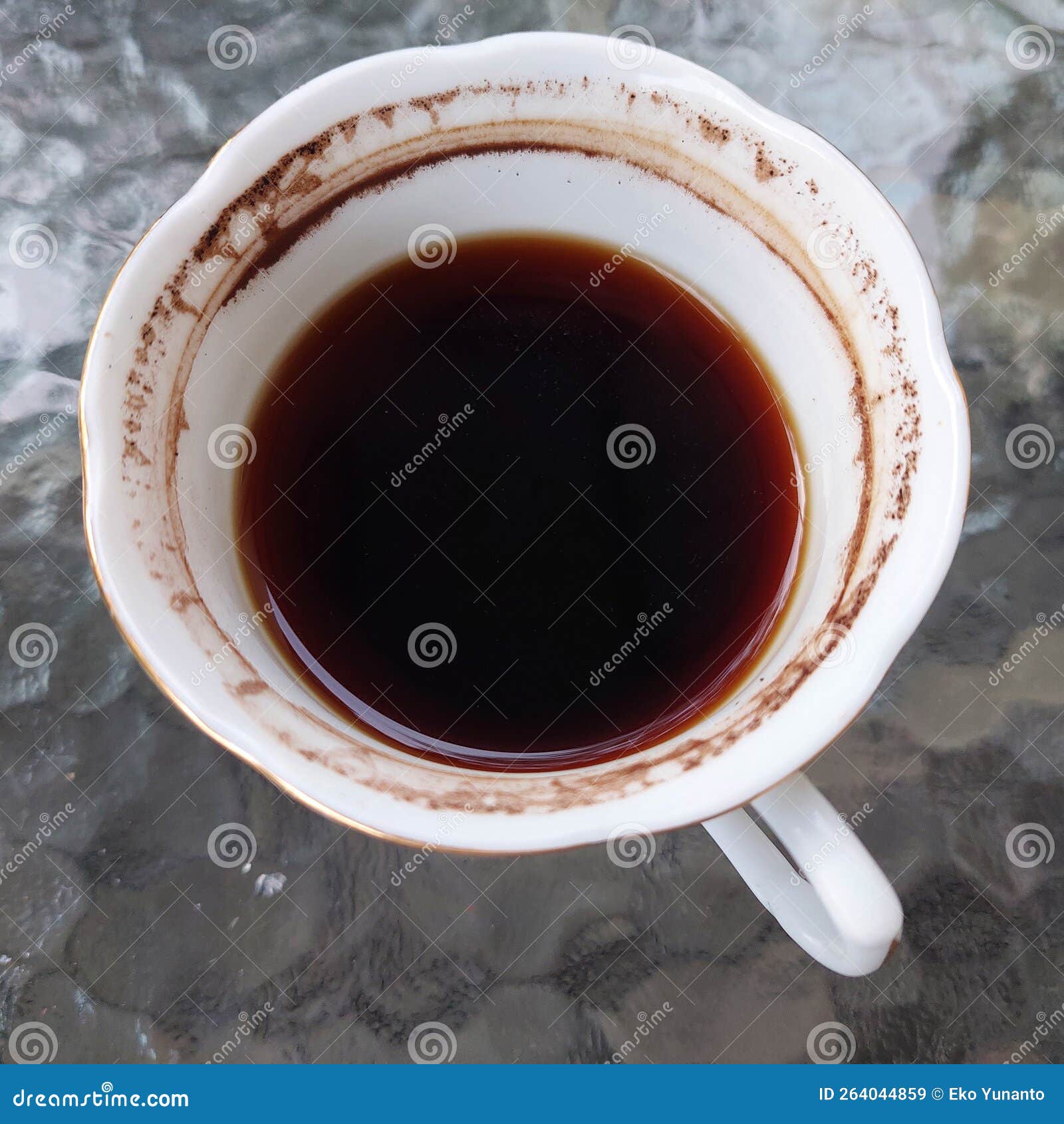 Coffee in a Partially Drunk Cup with Traces of Coffee on the Edge of ...