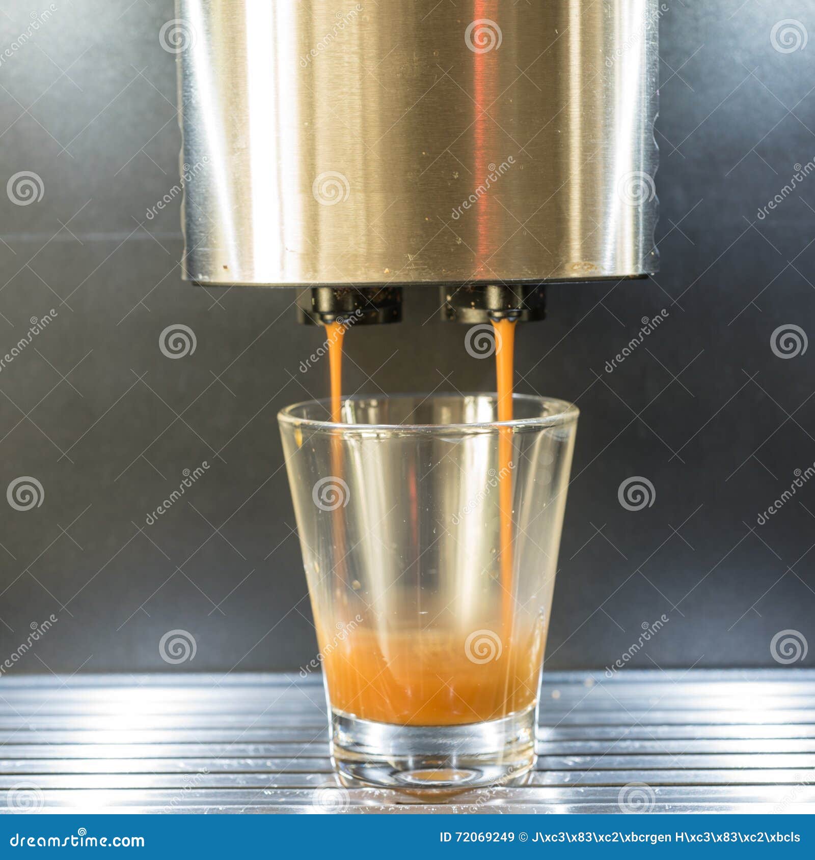 Coffee Poring Freshly Brewed from the Coffee Machine Stock Image ...