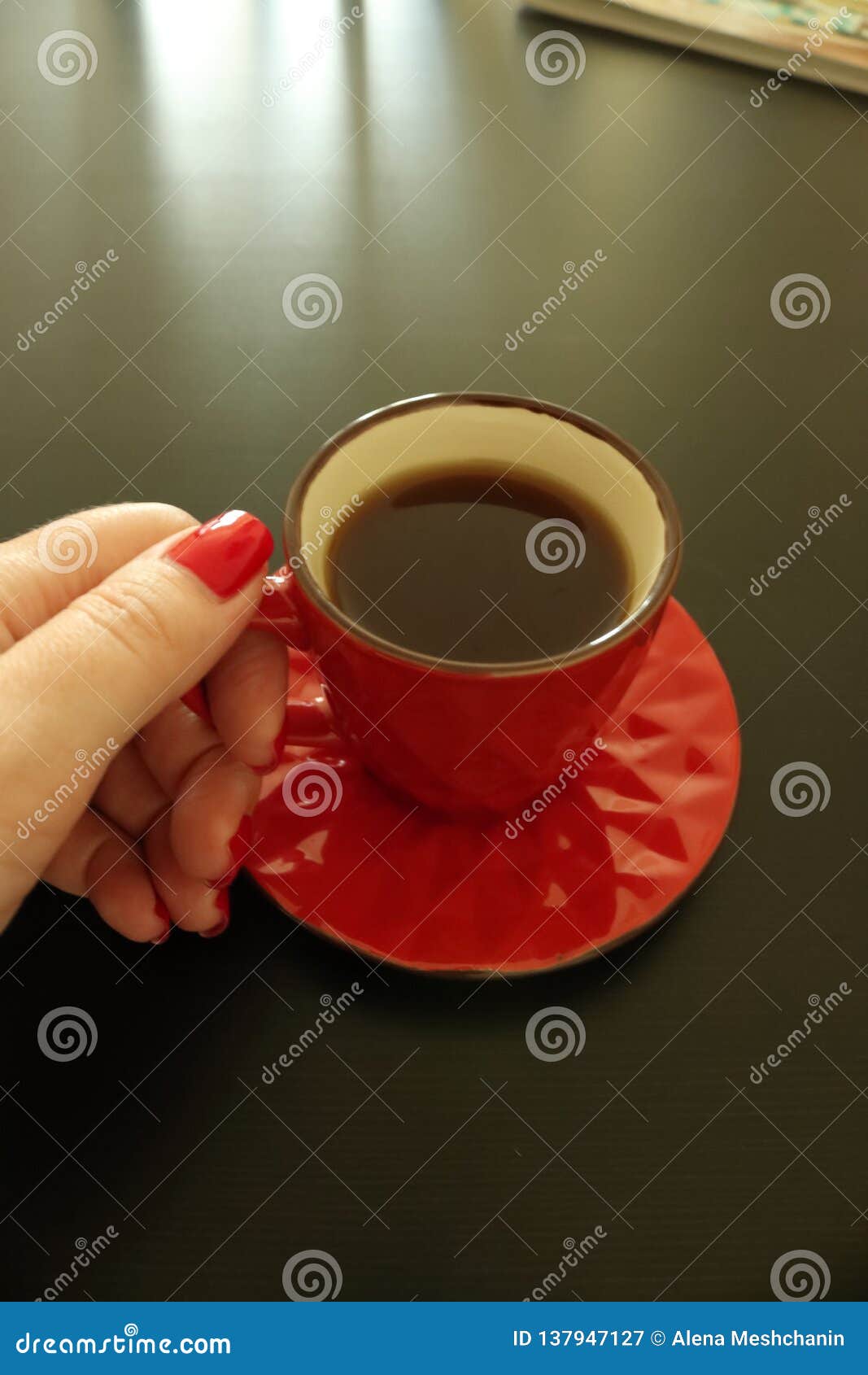 Coffee in the red cup stock image. Image of held, background - 137947127