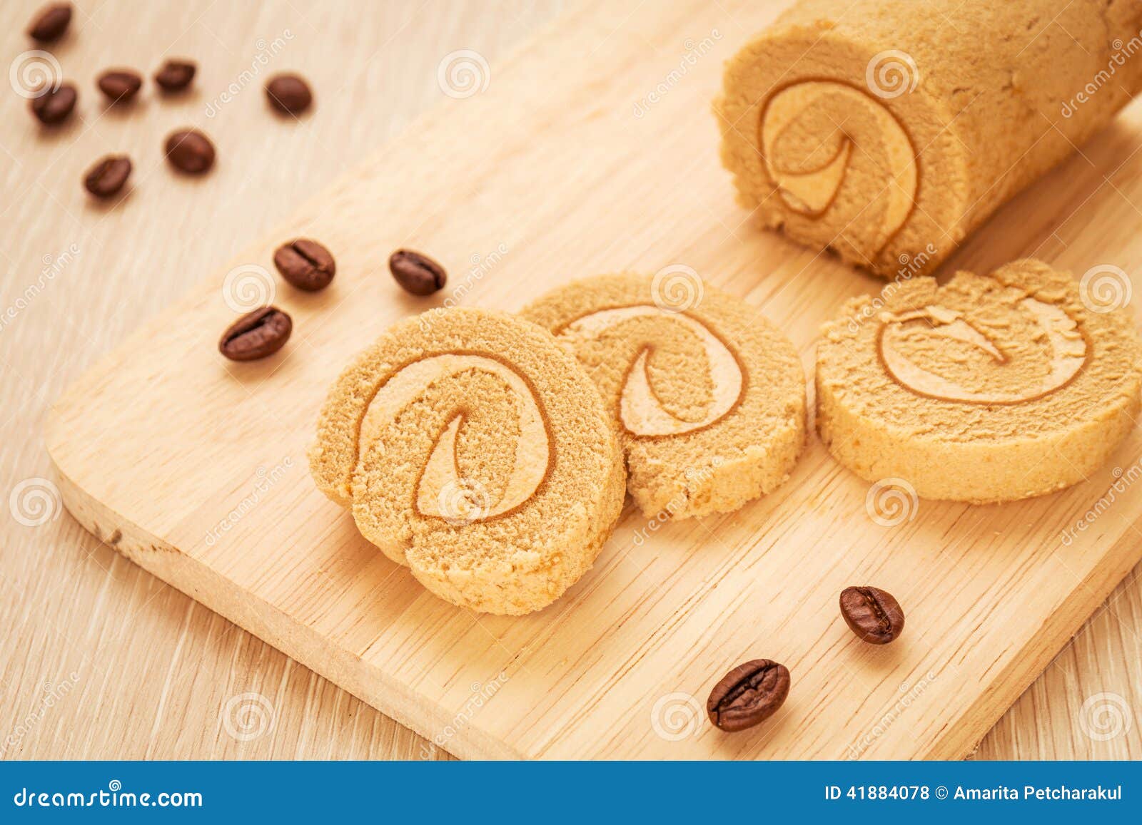 Coffee Roll Cake on Wooden Board and Coffee Beans Stock Photo - Image ...