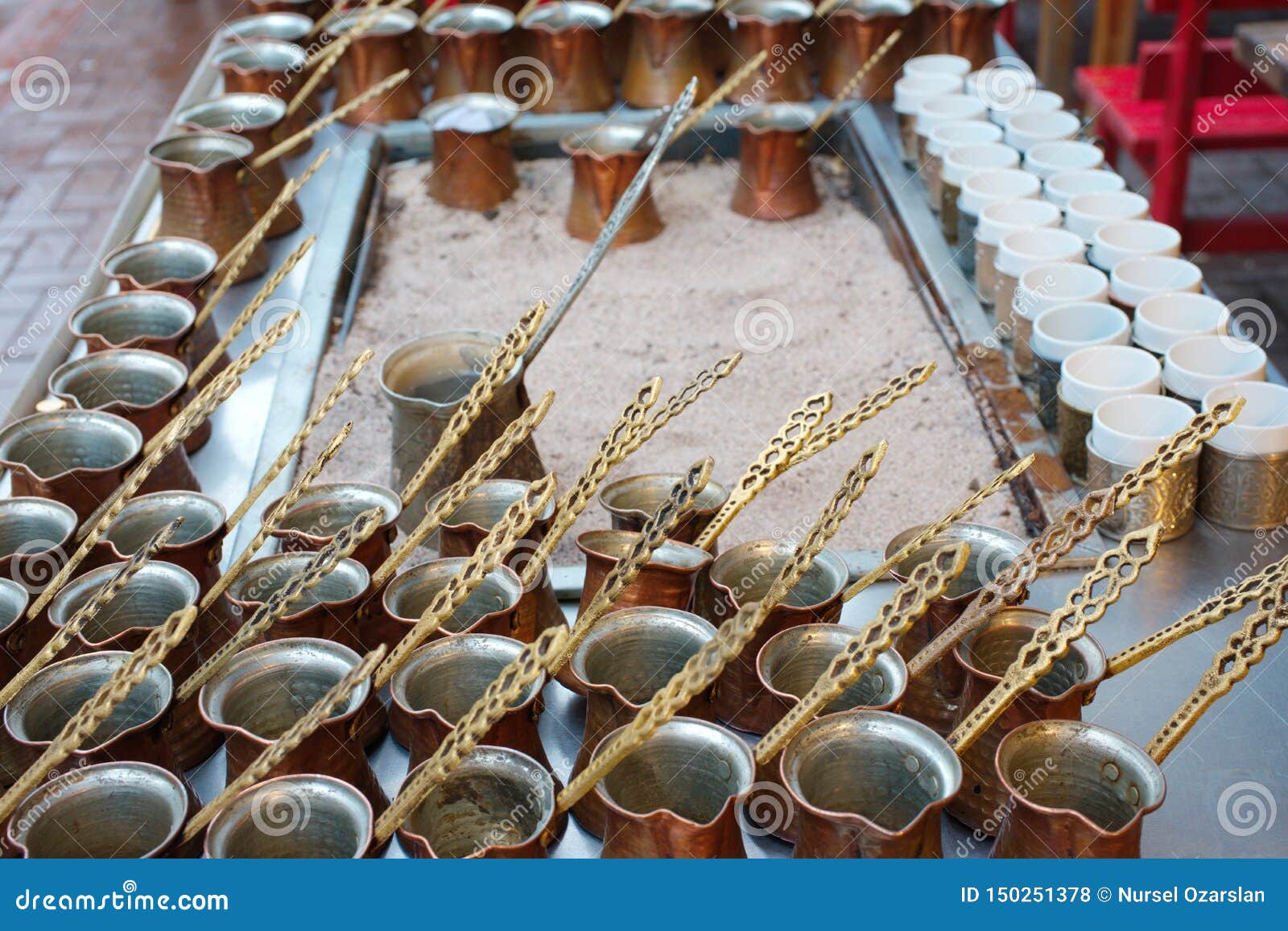 Coffee in the sand stock photo. Image of smoke, sand - 150251378