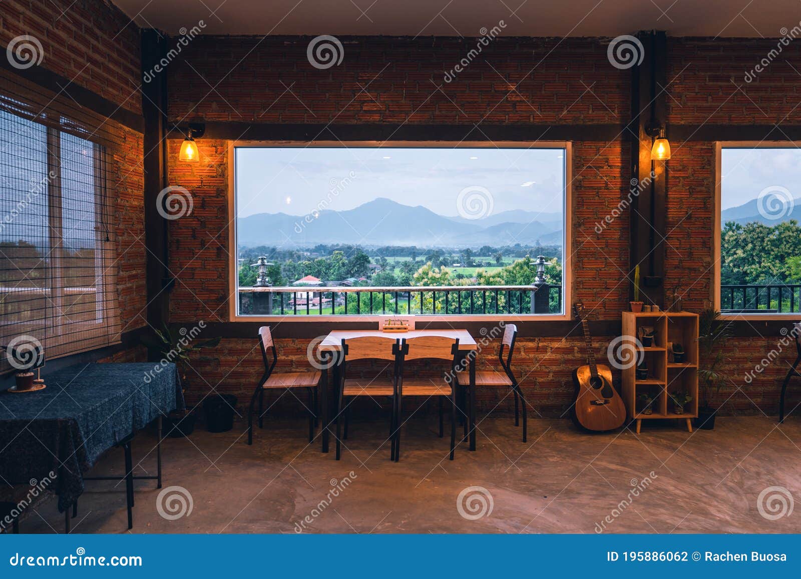 In a Coffee Shop, a Table and a Large Window View the Mountains Stock ...