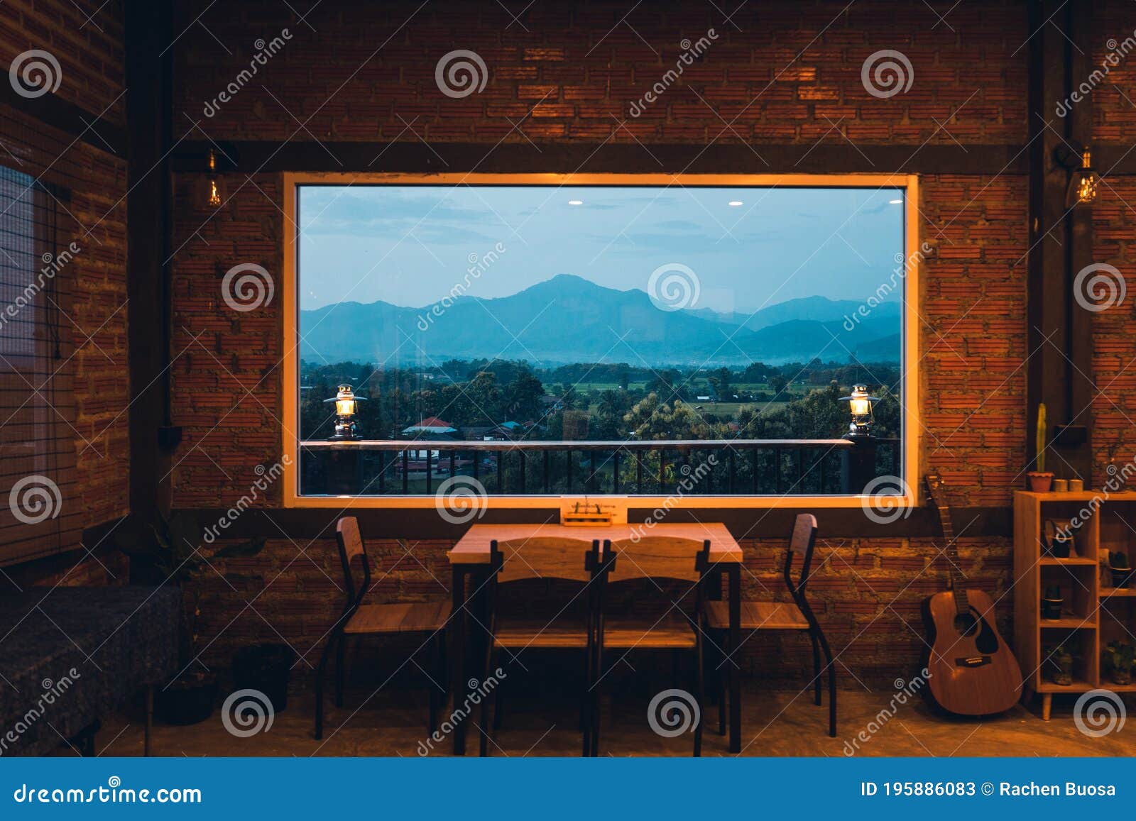 In a Coffee Shop, a Table and a Large Window View the Mountains Stock ...