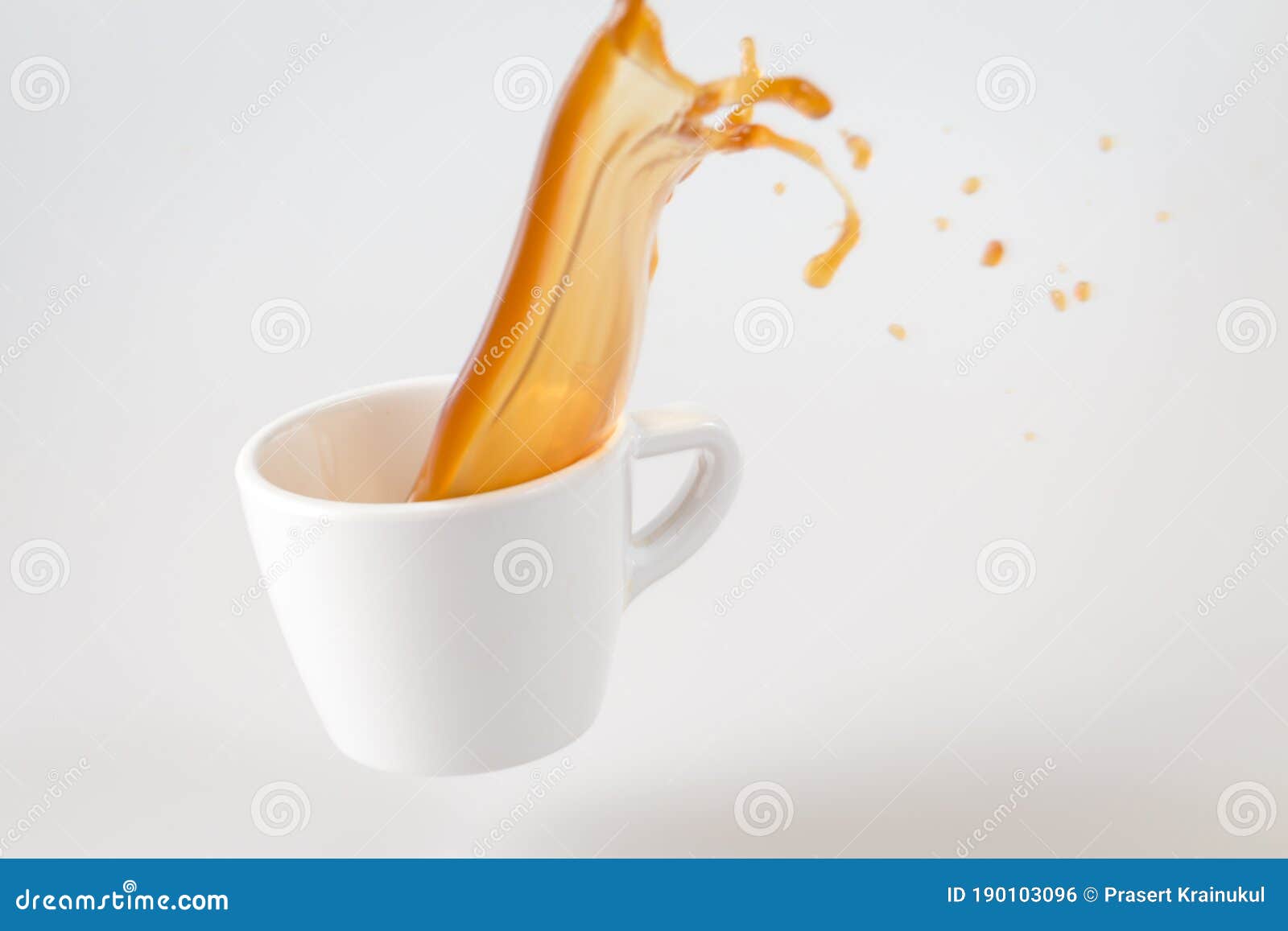 Coffee Splashing Out of a Cup Isolated on White Stock Photo - Image of ...