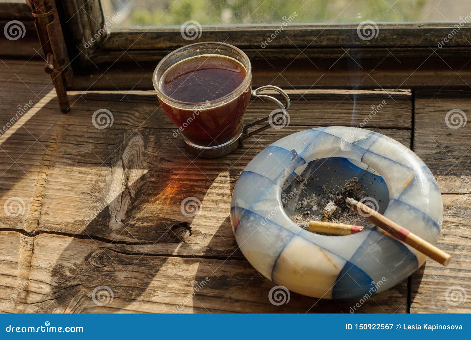 Coffee or Tea Cup and Ashtray for Cigarettes, Coffee Drinking Mug Stock ...
