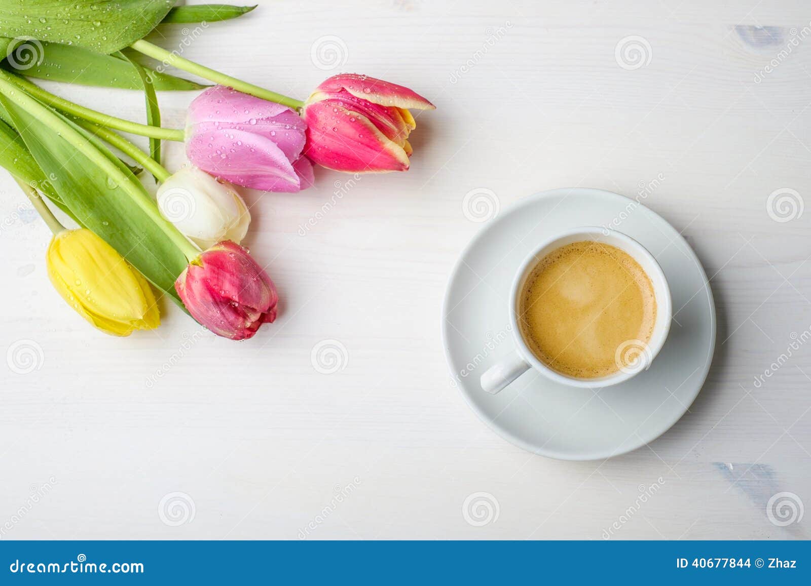 Coffee and Tulips on a White Wood Table with Some Water on the T Stock ...