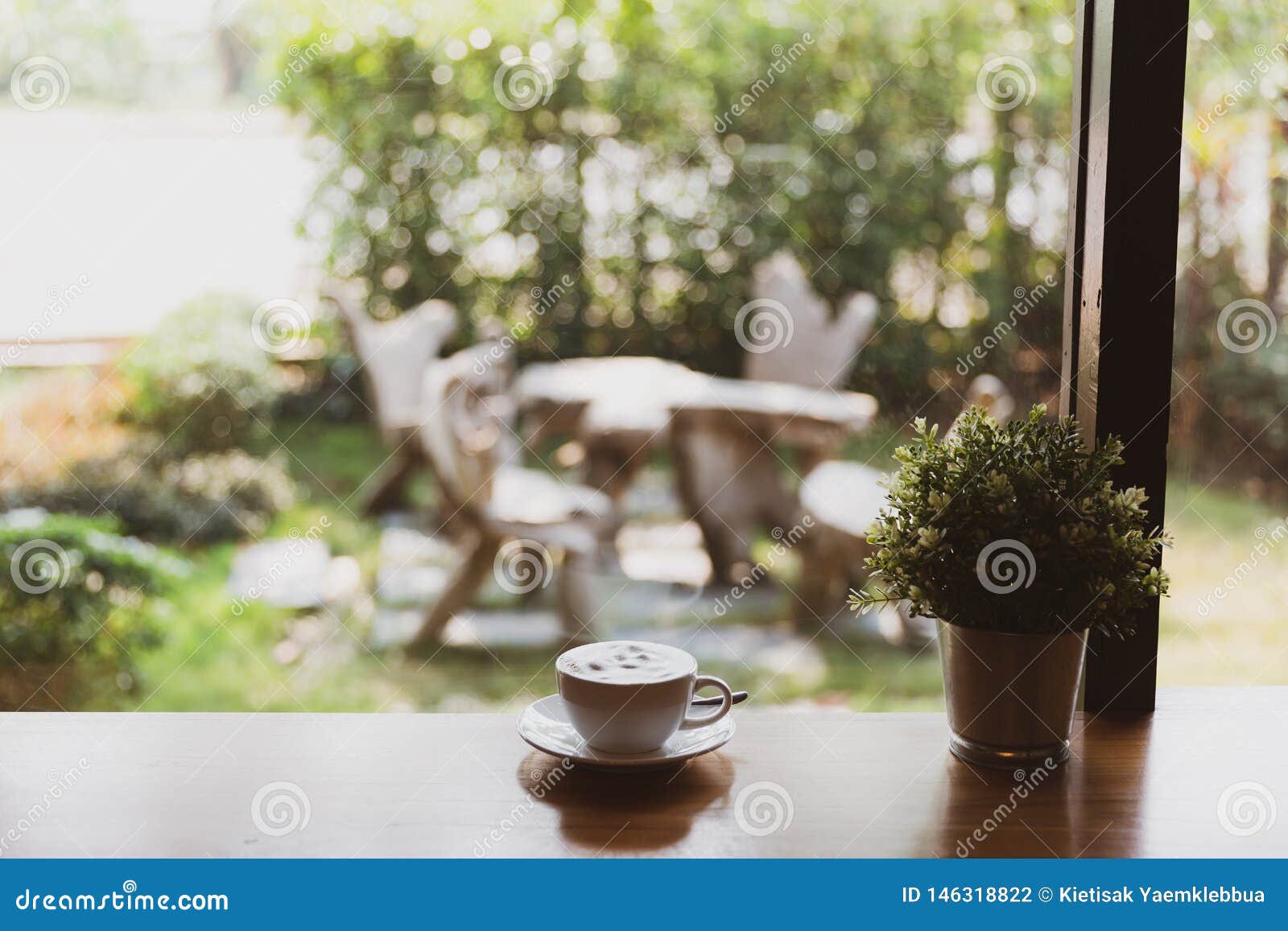 Coffee at the window stock photo. Image of window, view - 146318822