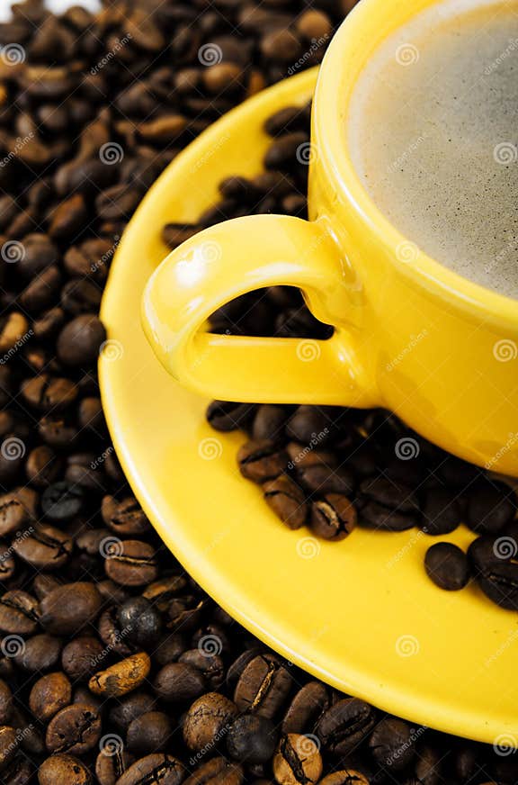 Coffee in yellow cup stock photo. Image of foam, heap - 29022068