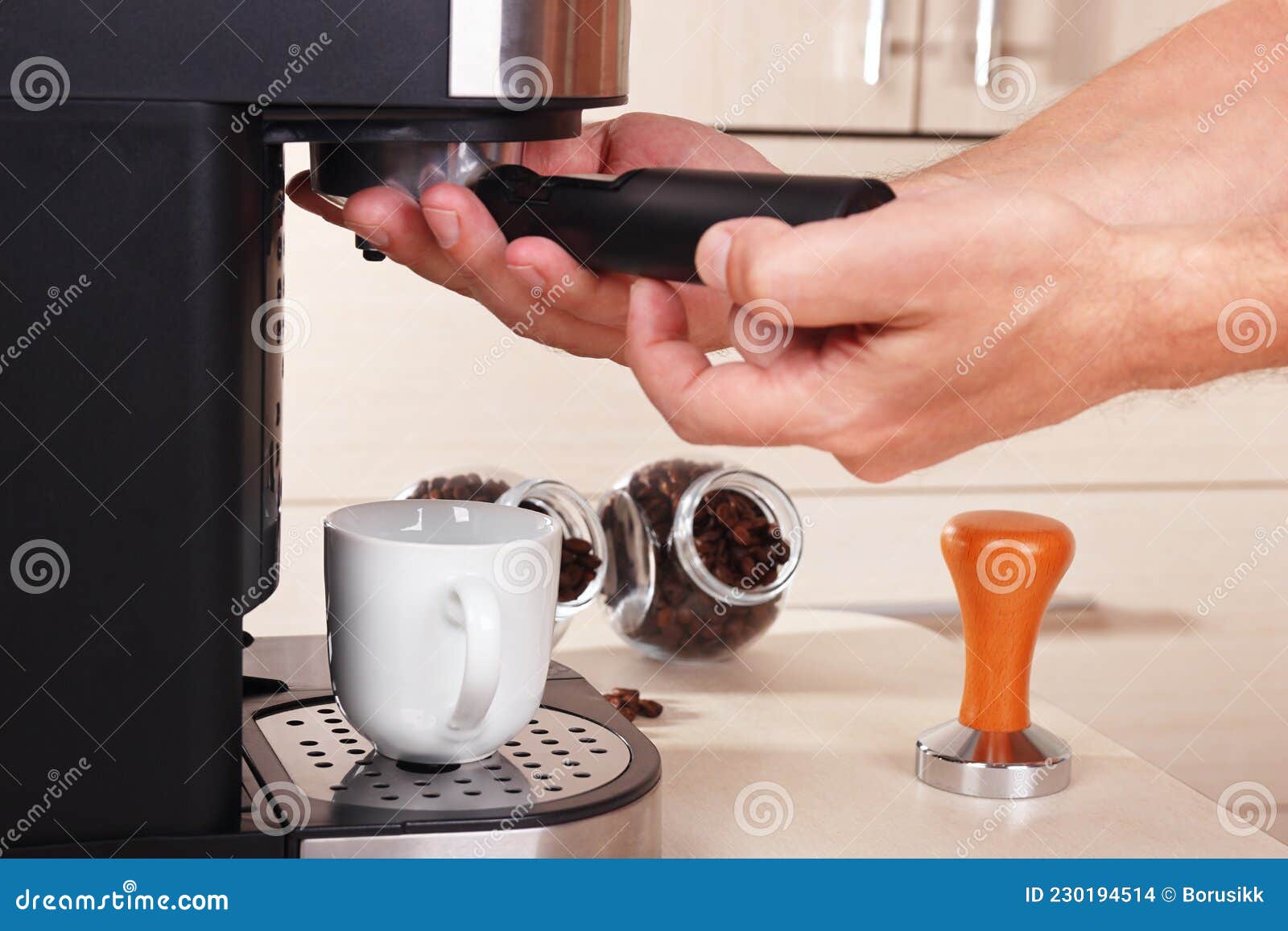 Coffeemaker Inserts Holder into Coffee Machine To Make Espresso Stock ...