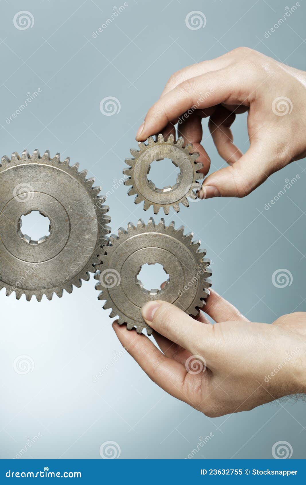 Cogs stock image. Image of hands, hand, gear, engineering - 23632755