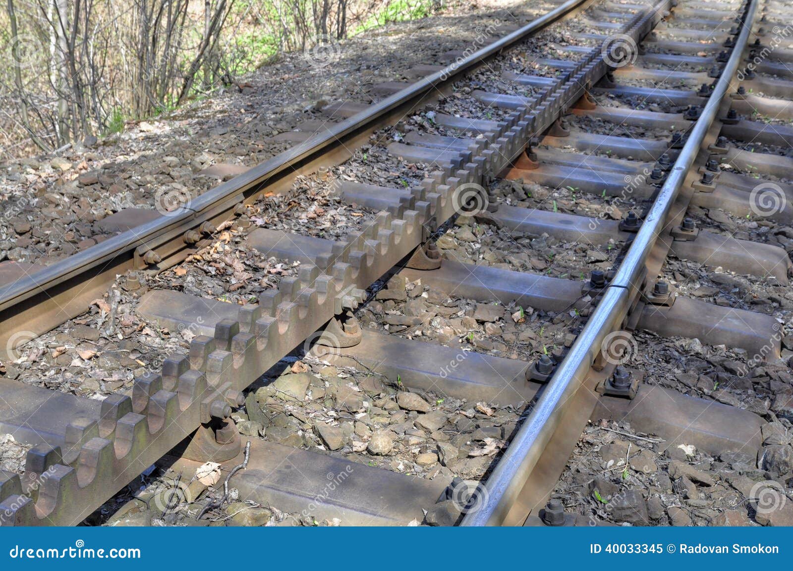 Cogwheel train tracks stock image. Image of bolt, gravel - 40033345