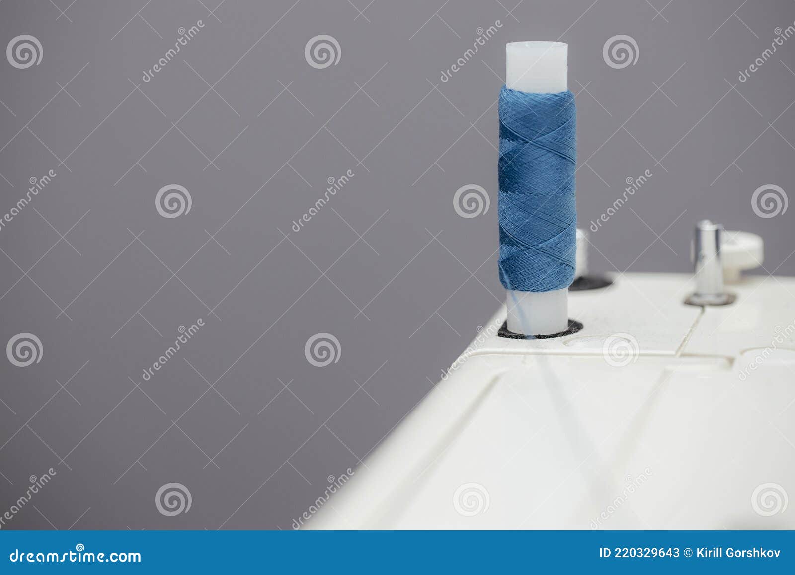 Coil with Blue Threads Installed on a Sewing Machine Stock Image ...
