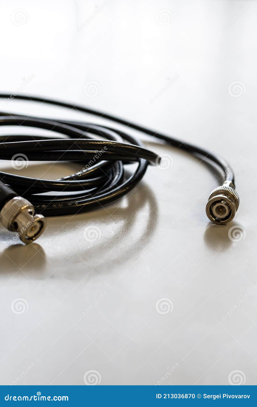 Coil of Coaxial Wire on a Light Background for Transmitting Radio ...