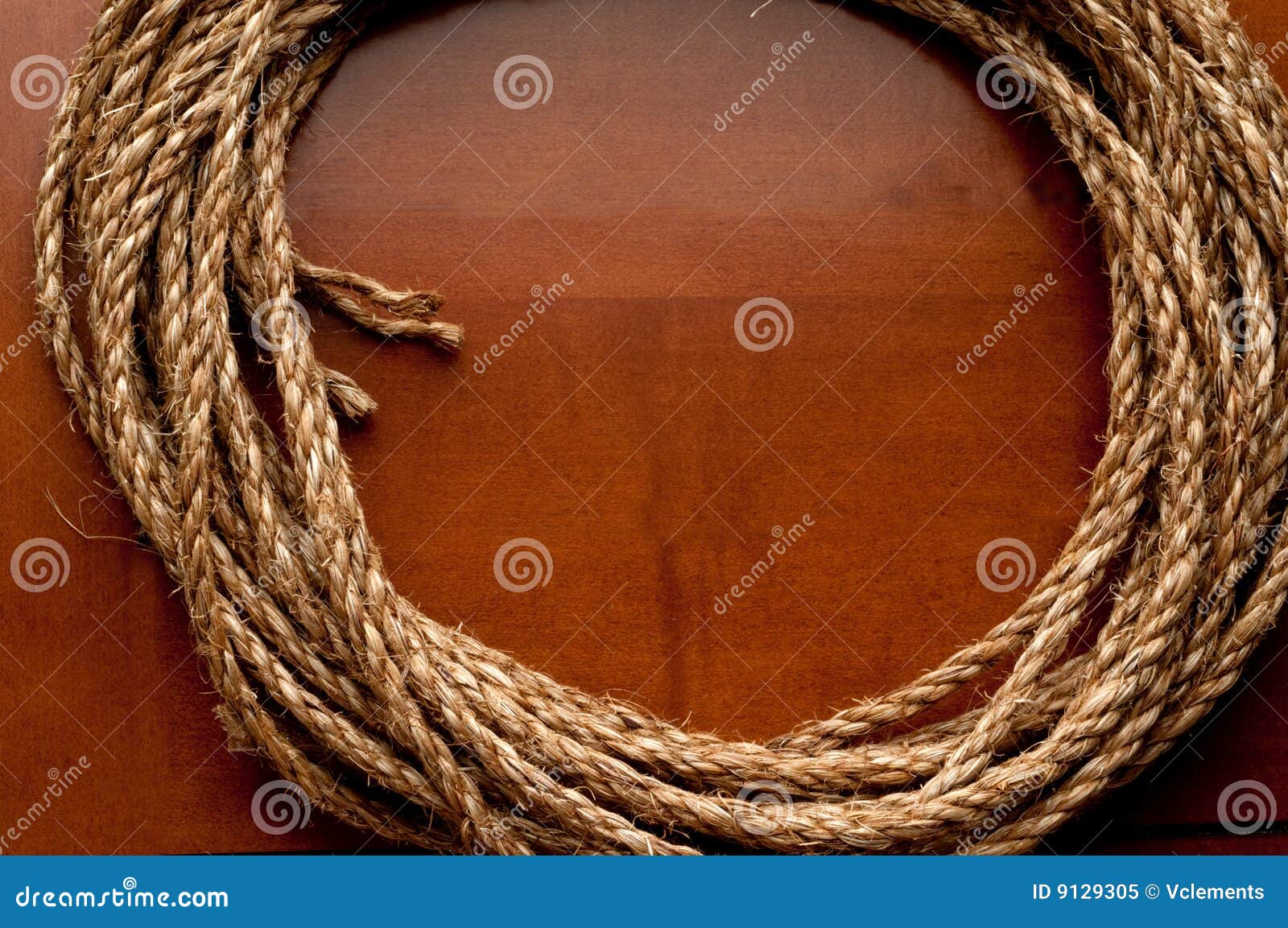Coil of Rope on a Wooden Surface Stock Image - Image of wood, loop: 9129305