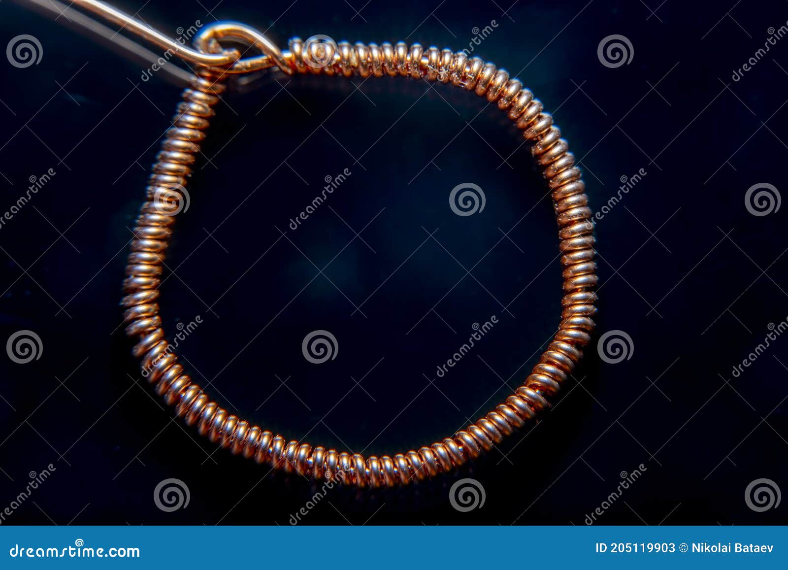 Coil Spring Made of Copper Wire, Hand Rolled into a Ring Stock Image ...