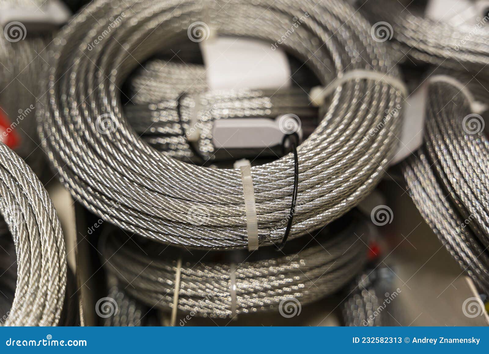 A Coil of Steel Cable on the Counter of a Construction Store Stock ...