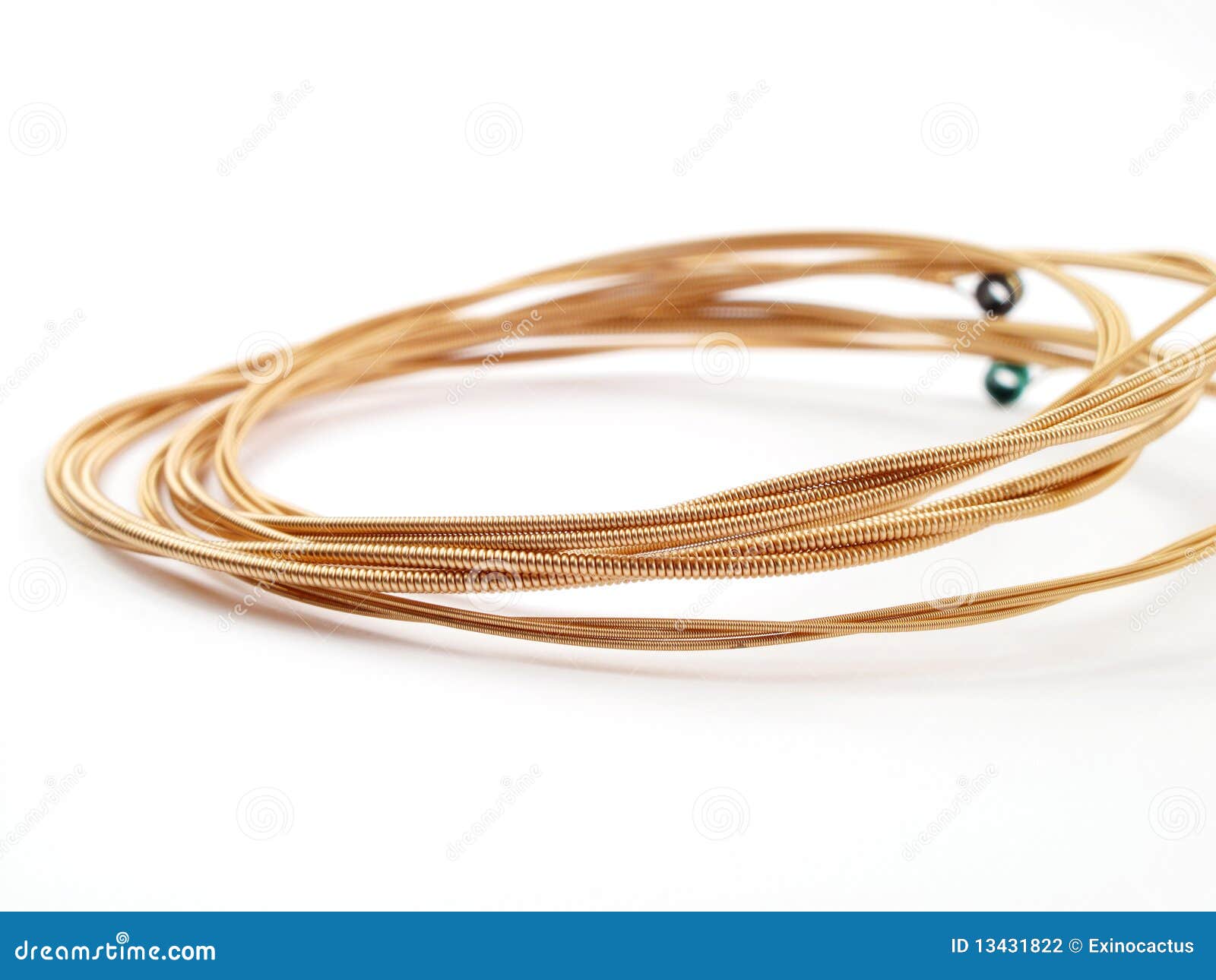 Coiled Acoustic Guitar Strings Stock Photo - Image of abstract, bass ...