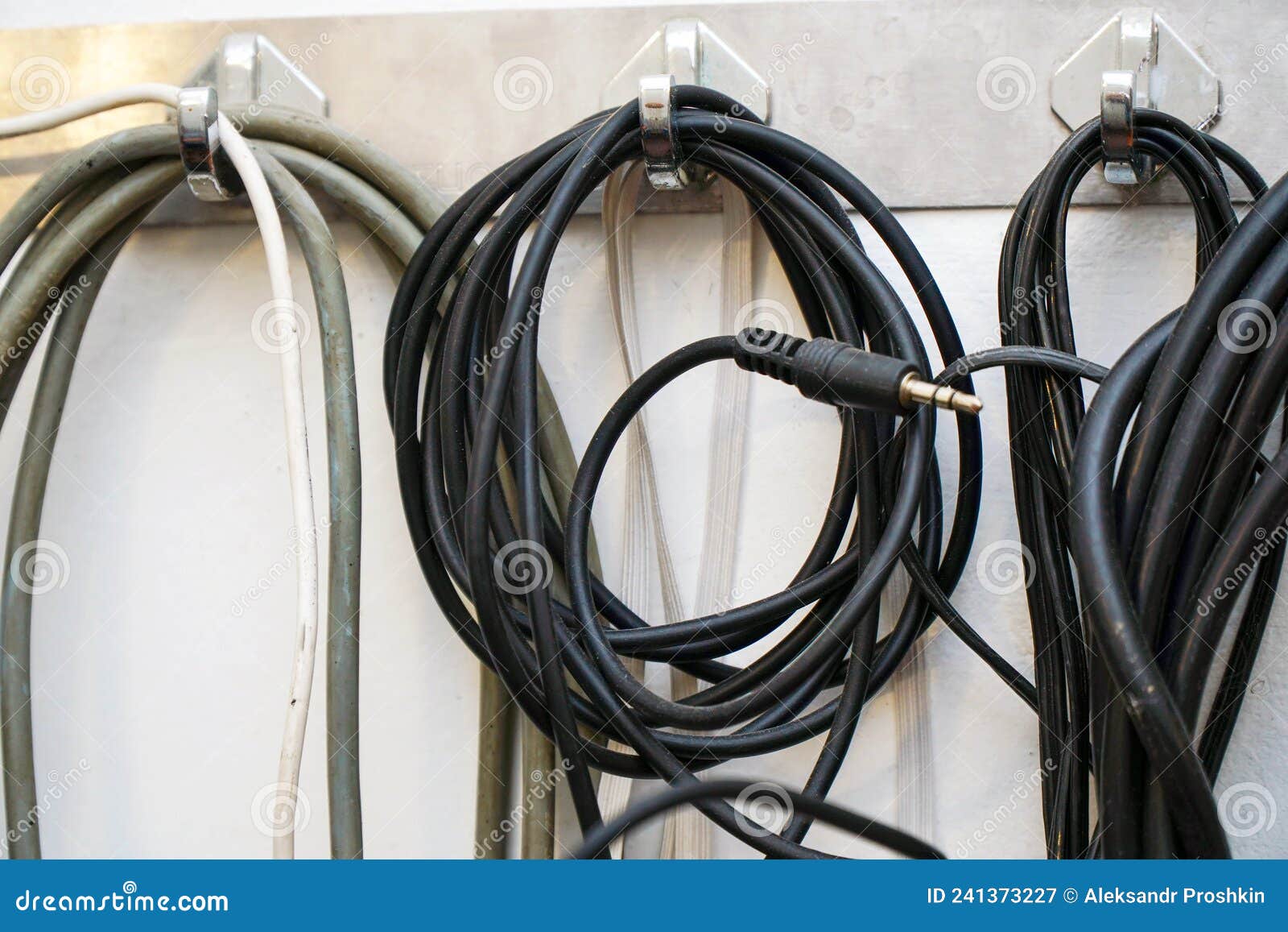 Coiled Audio Cables Hang on the Wall in Studio Stock Image - Image of ...