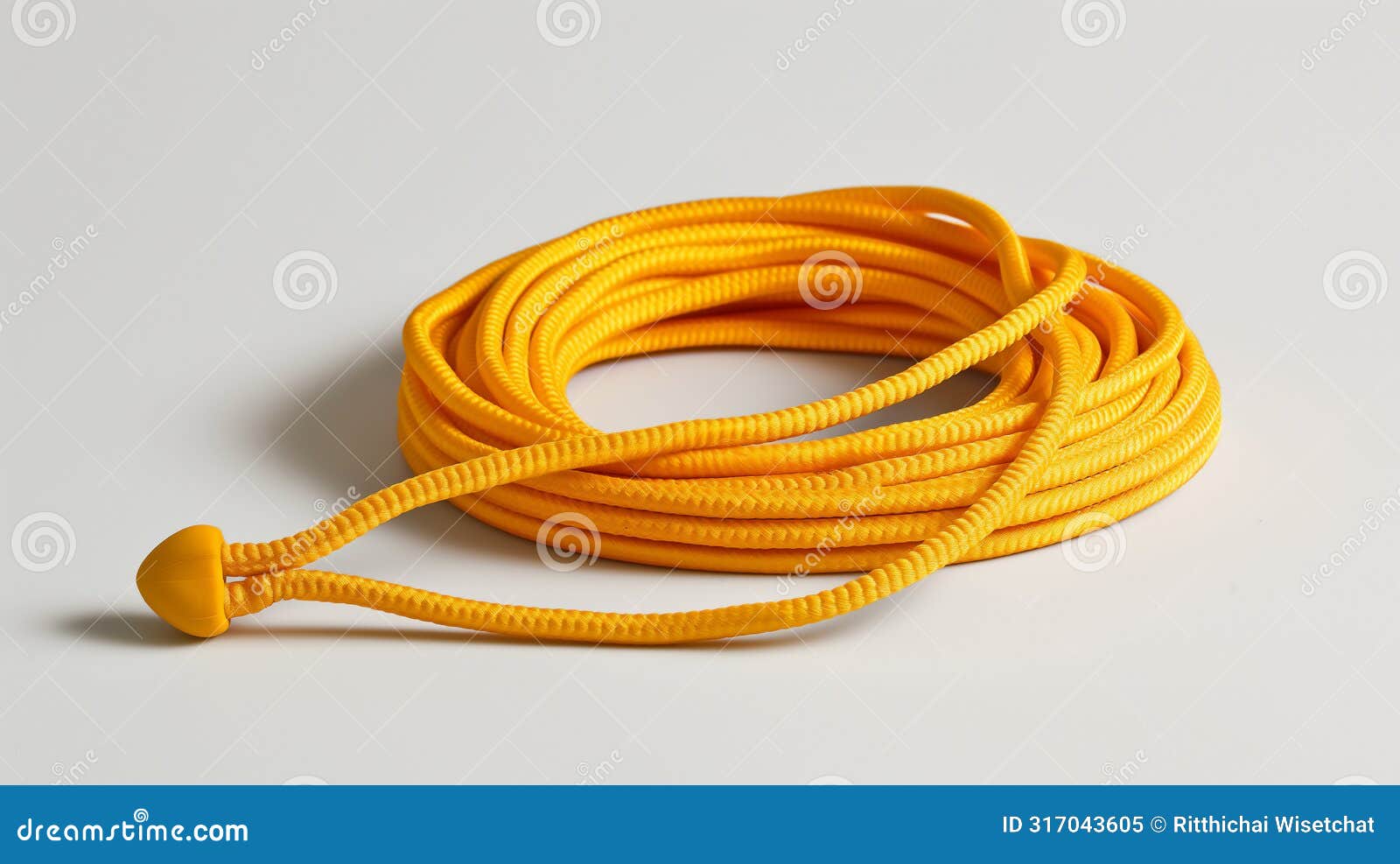 A Coiled Bright Yellow Rope with a Textured Surface and a Molded ...