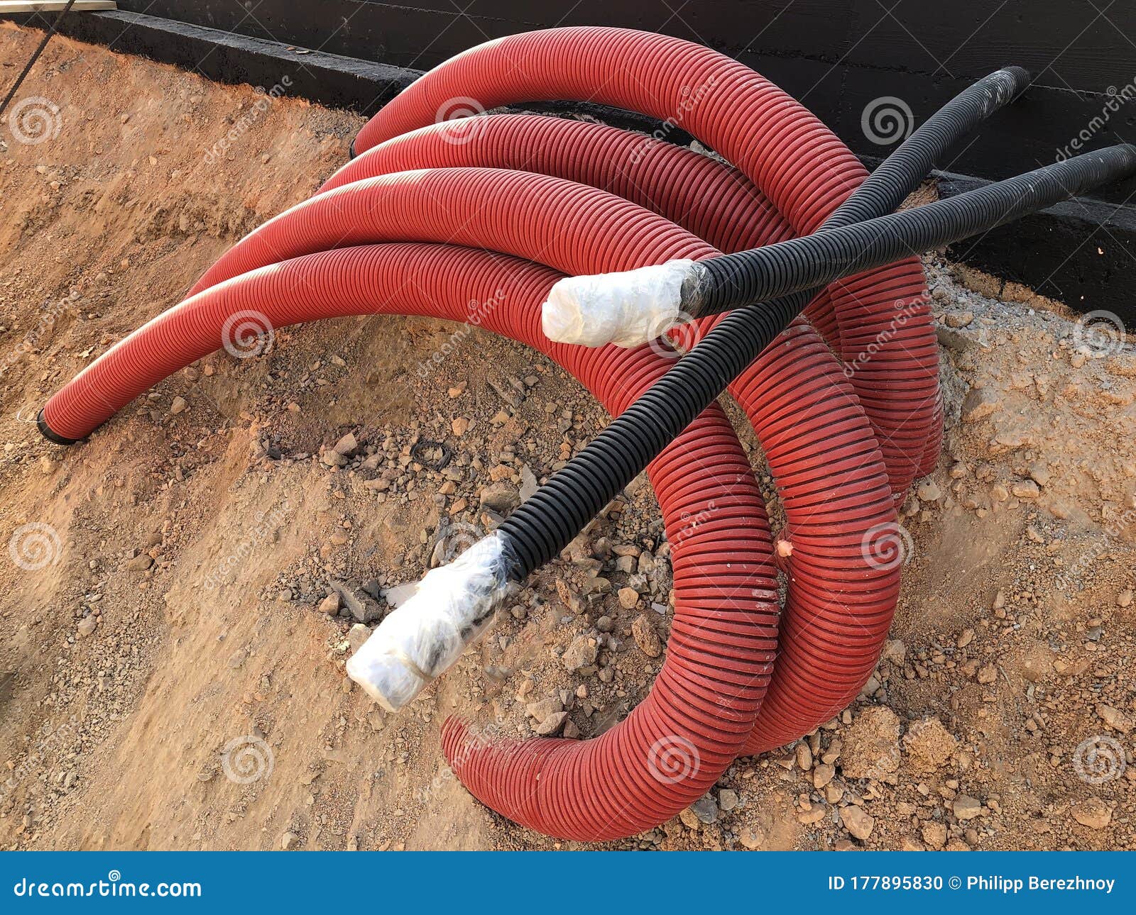 Coiled Corrugated Pipes And High Voltage Cables Stock Photography ...