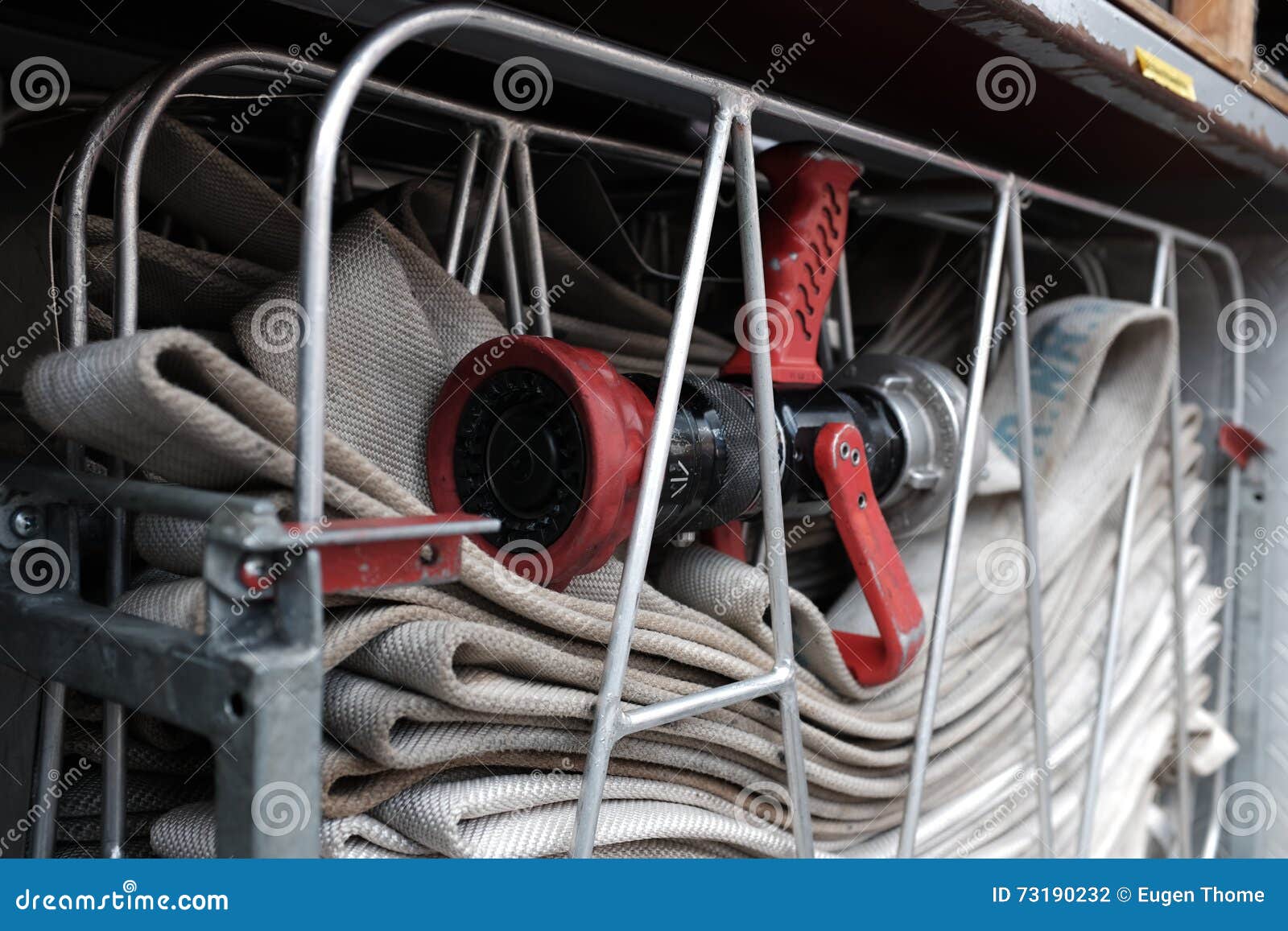 Coiled fire hoses stock photo. Image of storz, flat, fighting - 73190232