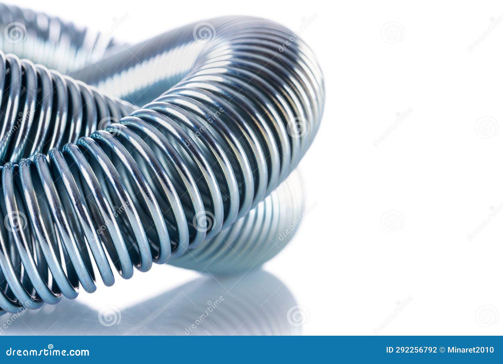 Coiled Metal Spring Isolated on White Stock Photo - Image of metallic ...