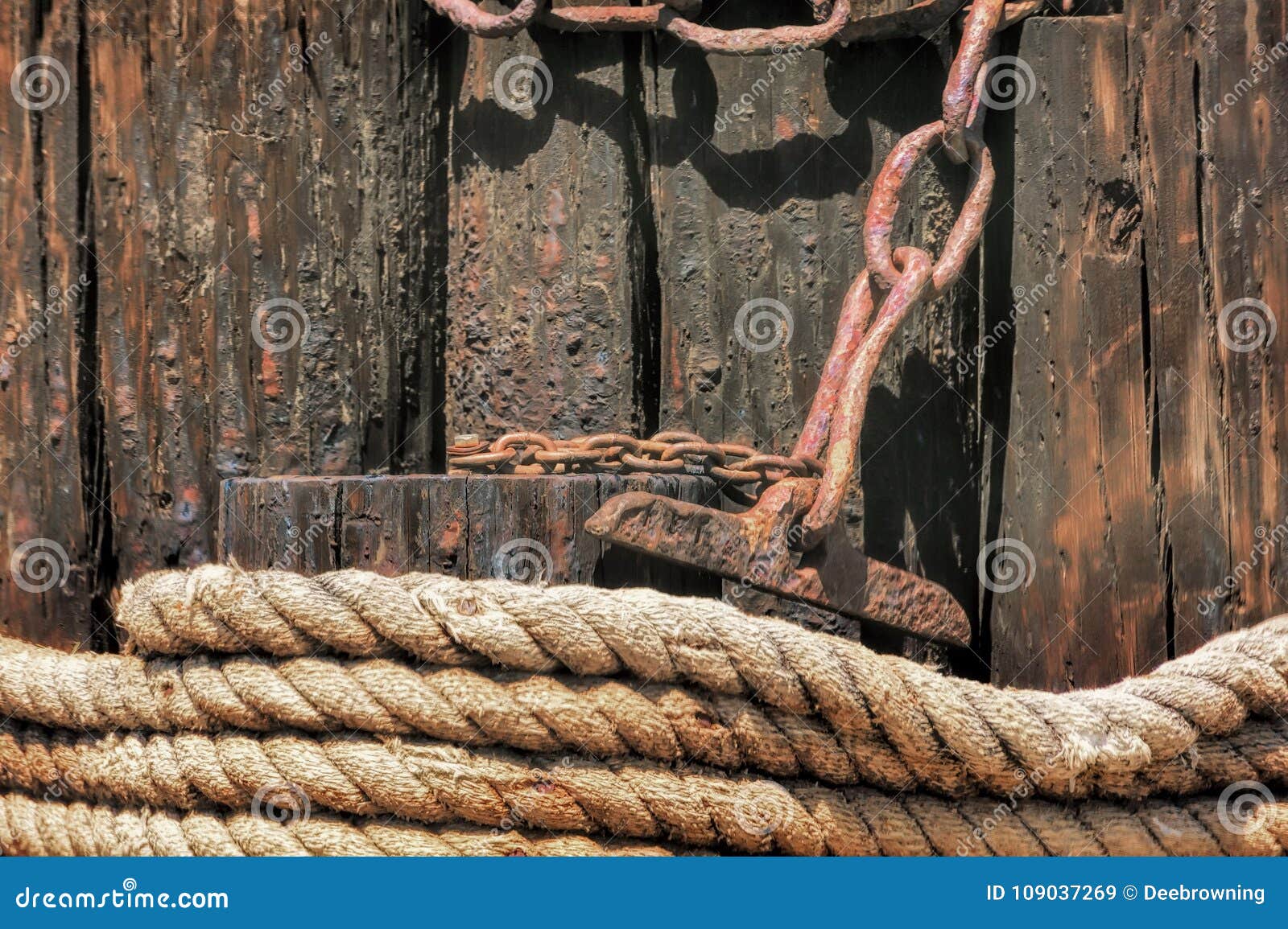 Coiled rope on a dock stock image. Image of links, rusty - 109037269