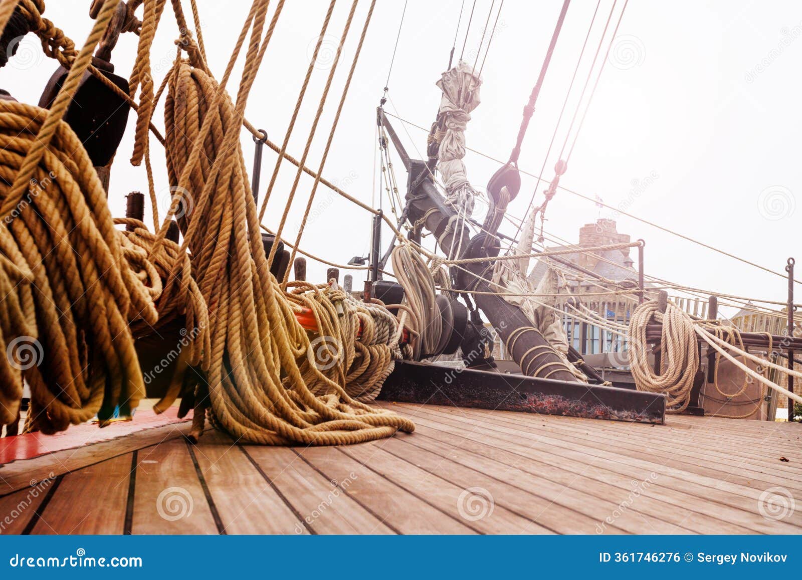 Coiled Ropes Organized on a Sunlit Ship Deck, Ready for Sailing Stock ...