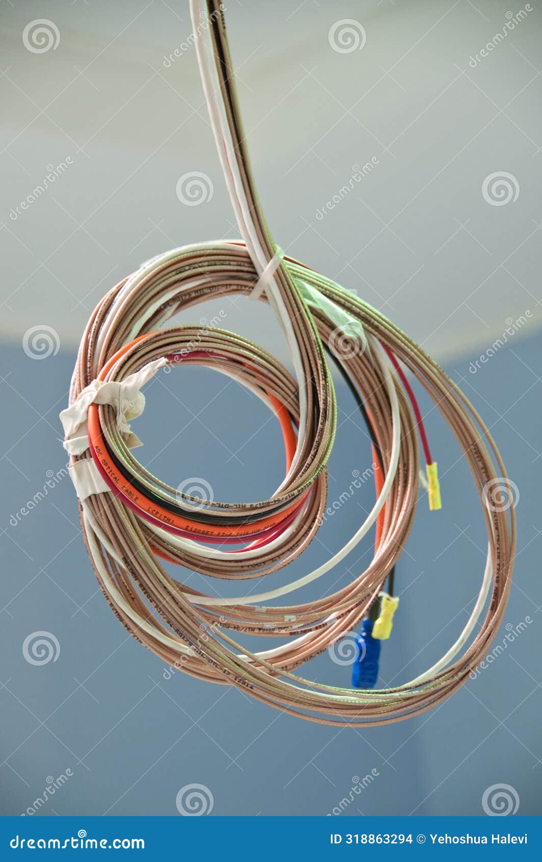 Coiled Wire Hanging from a Ceiling Stock Photo - Image of wire, build ...