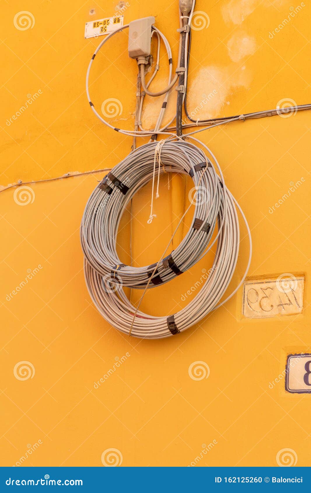 Coils Cables Wall stock photo. Image of yellow, internet - 162125260
