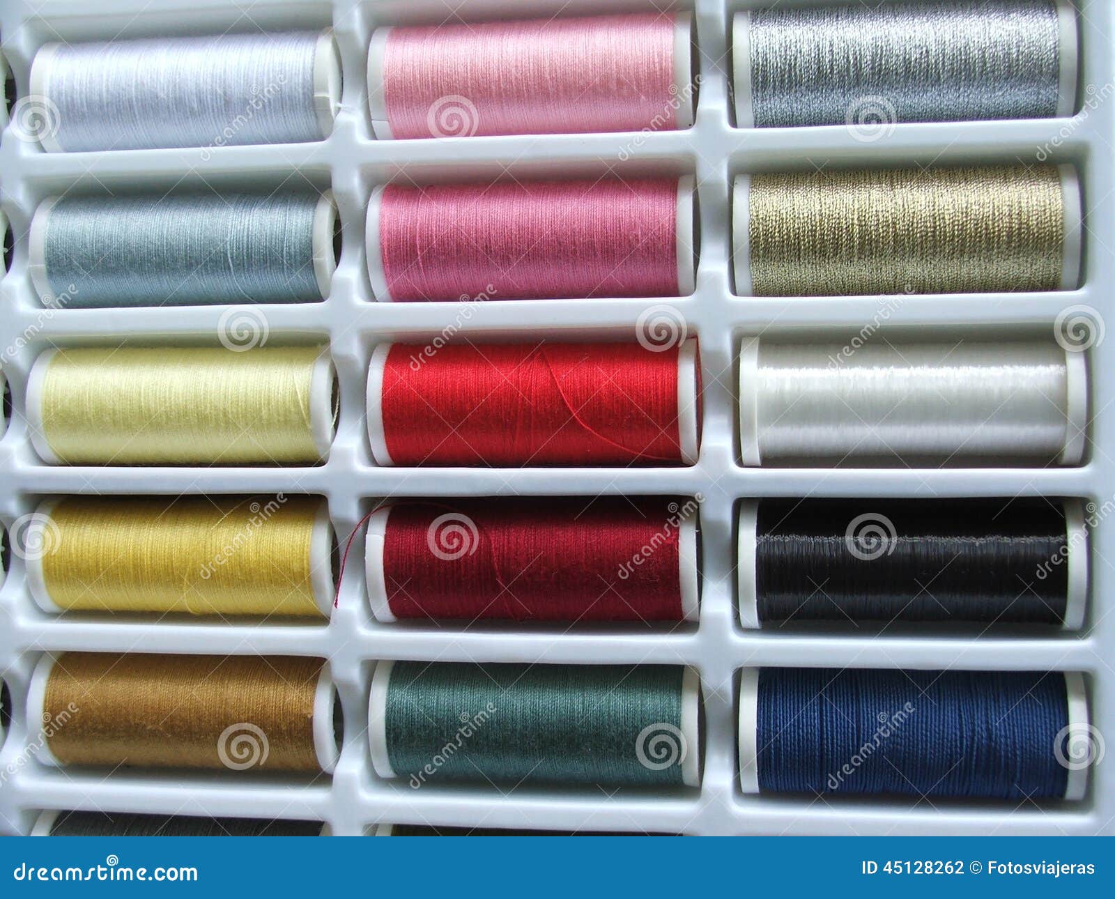 Coils of color threads stock photo. Image of sewing, arranged - 45128262