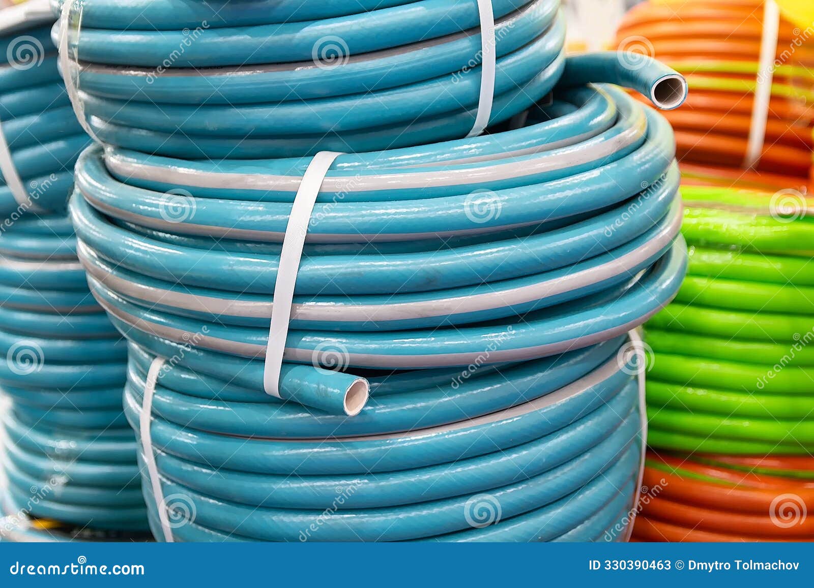 Coils with Multi-colored Rubber Hoses on a Store Window Stock Image ...