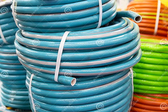 Coils with Multi-colored Rubber Hoses on a Store Window Stock Image ...