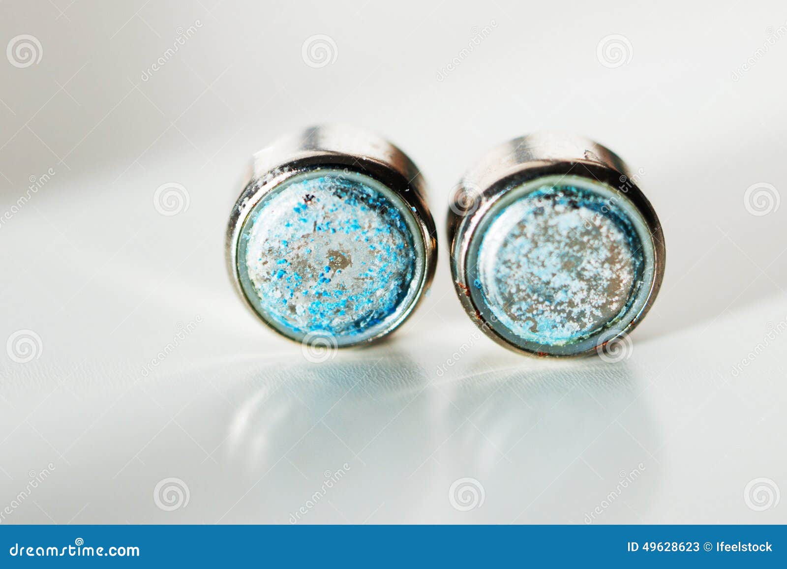 Coin Batteries Corroded on White Background Stock Image - Image of blue ...