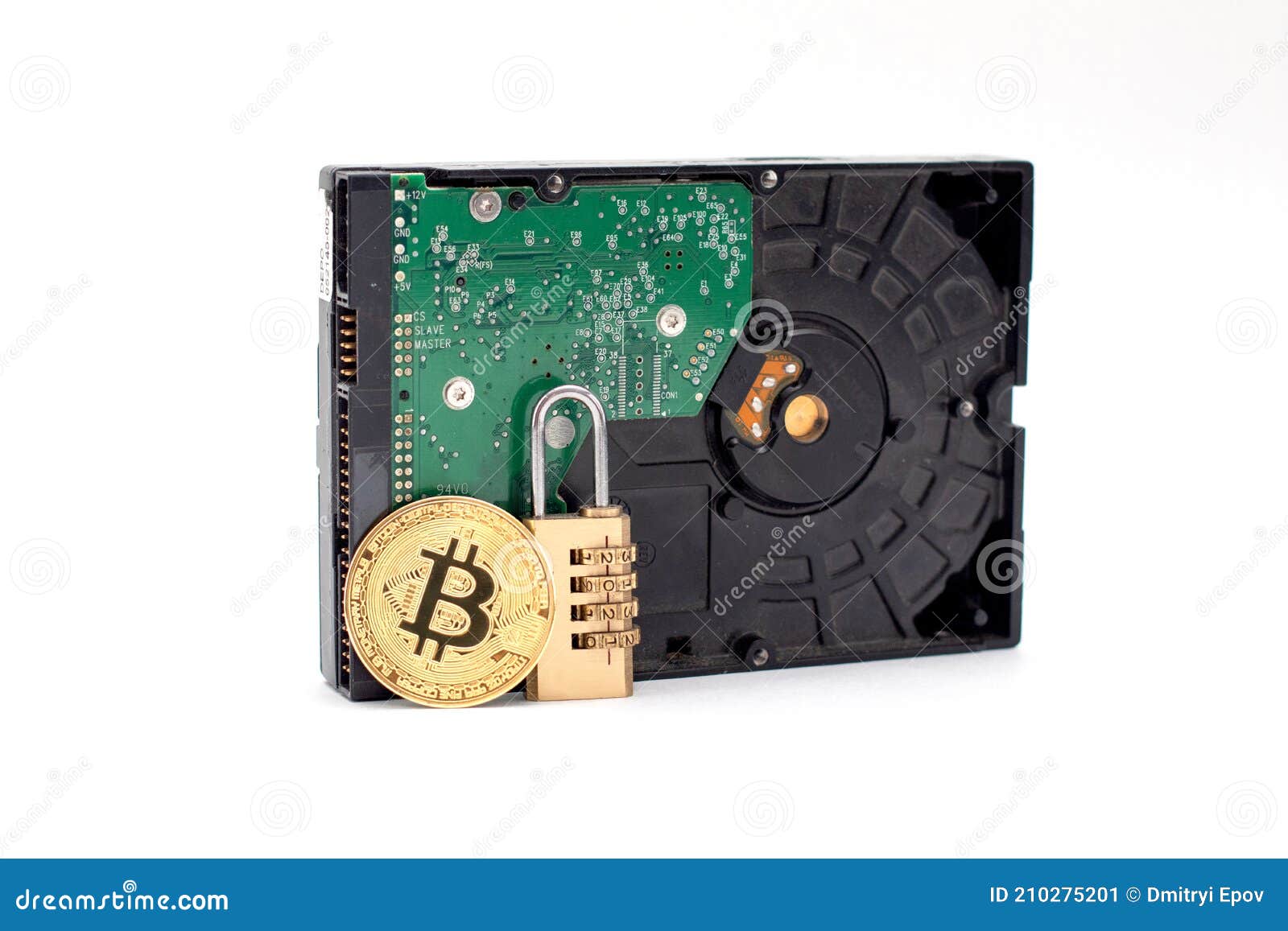 Coin of Bitcoin on Hard Disc Drive. Combination Padlock with Coin of ...