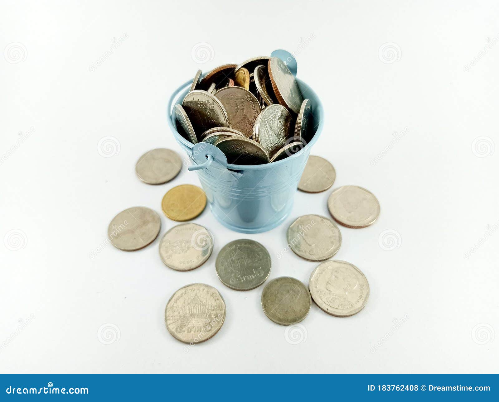 Coin in a Bucket and on the Floor Stock Photo - Image of currency ...