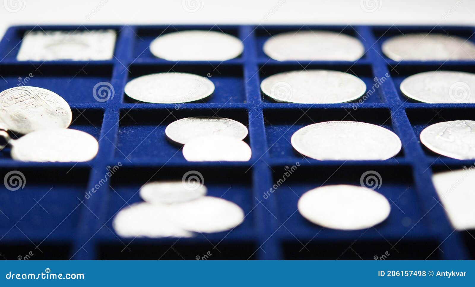 Coin Collection in Blue Coin Tray Isolated Stock Photo - Image of ...