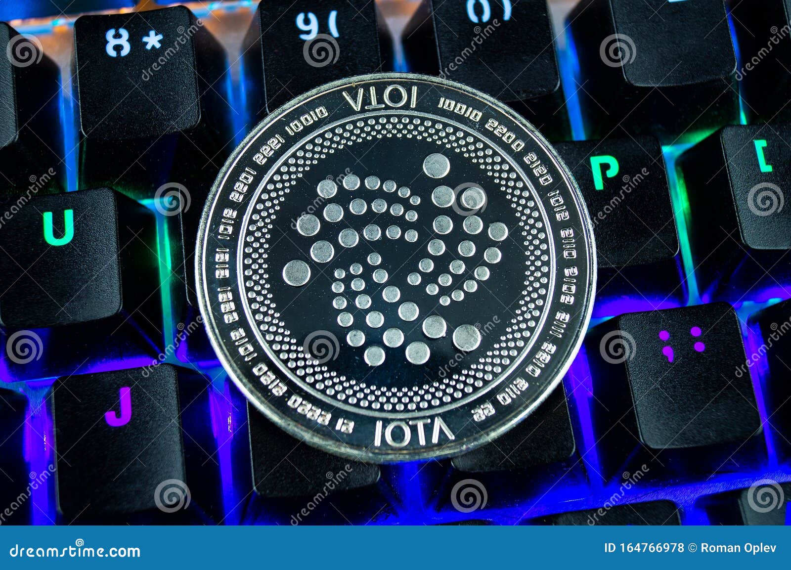 Coin Cryptocurrency IOTA Close-up of the Colour-coded Keyboard ... Coin Cryptocurrency IOTA Close-up of the Colour-coded Keyboard ...