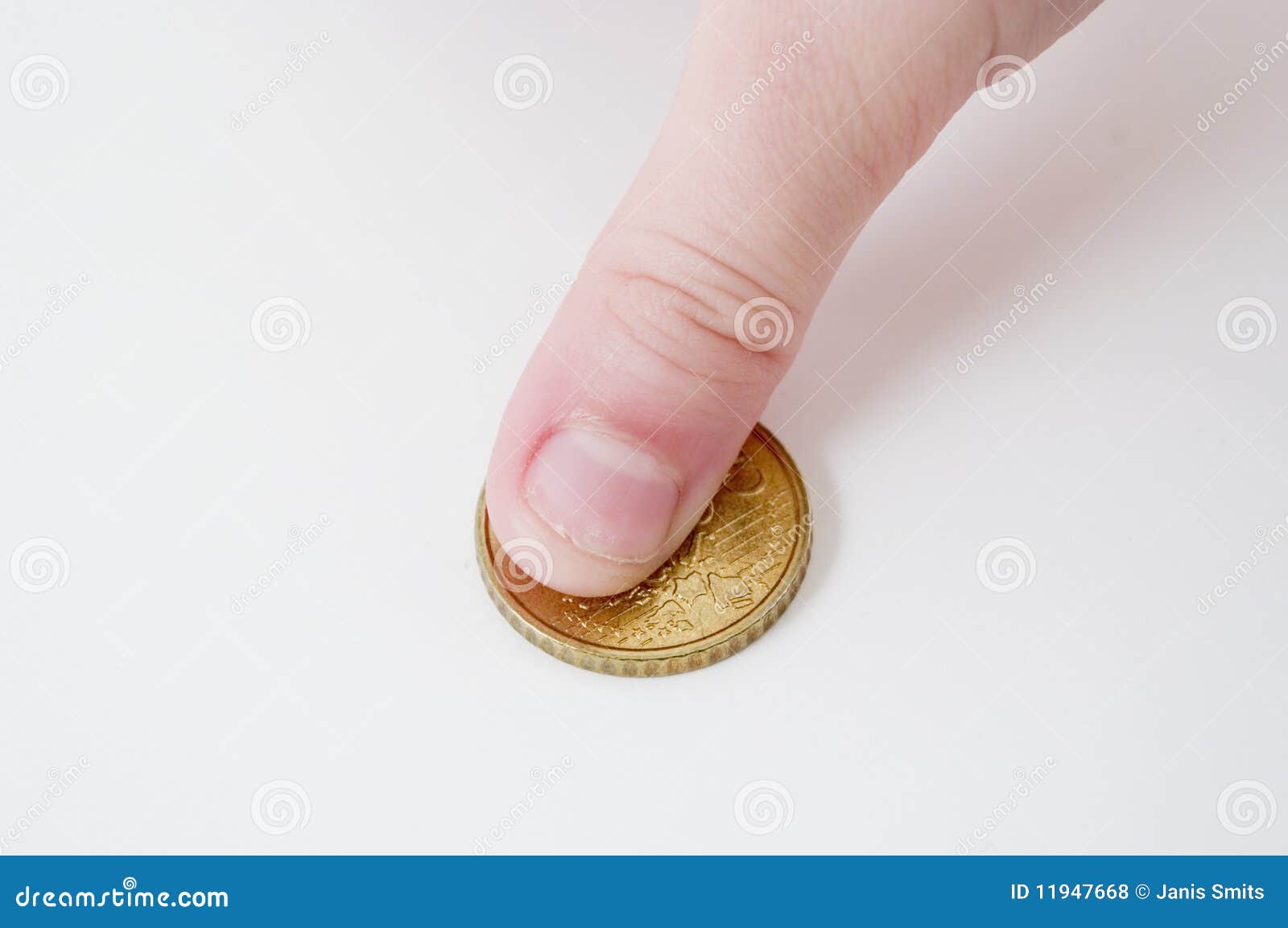 Coin and finger. stock photo. Image of hand, metal, isolated - 11947668