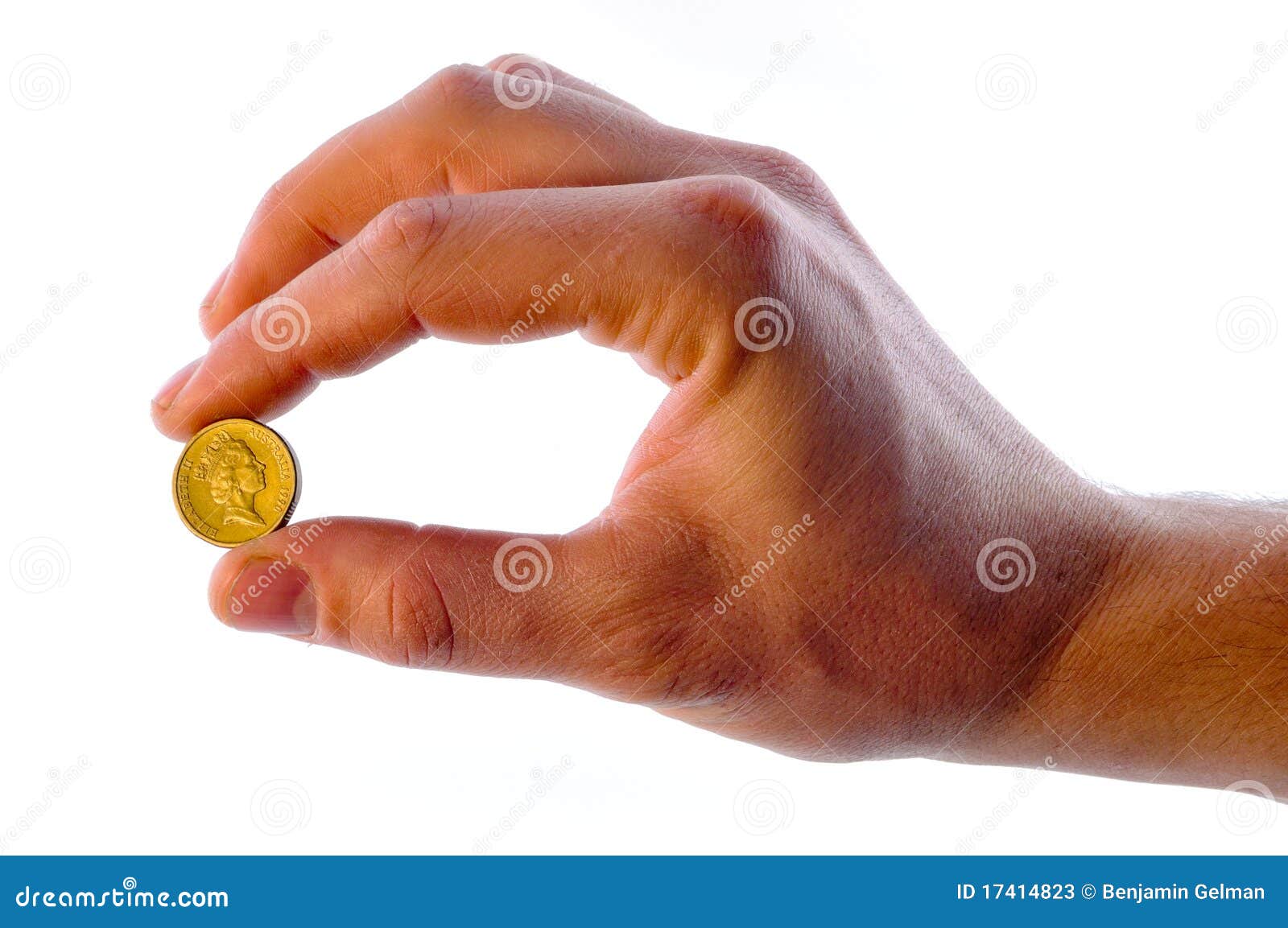 Coin in hand stock image. Image of coin, thumb, gold - 17414823