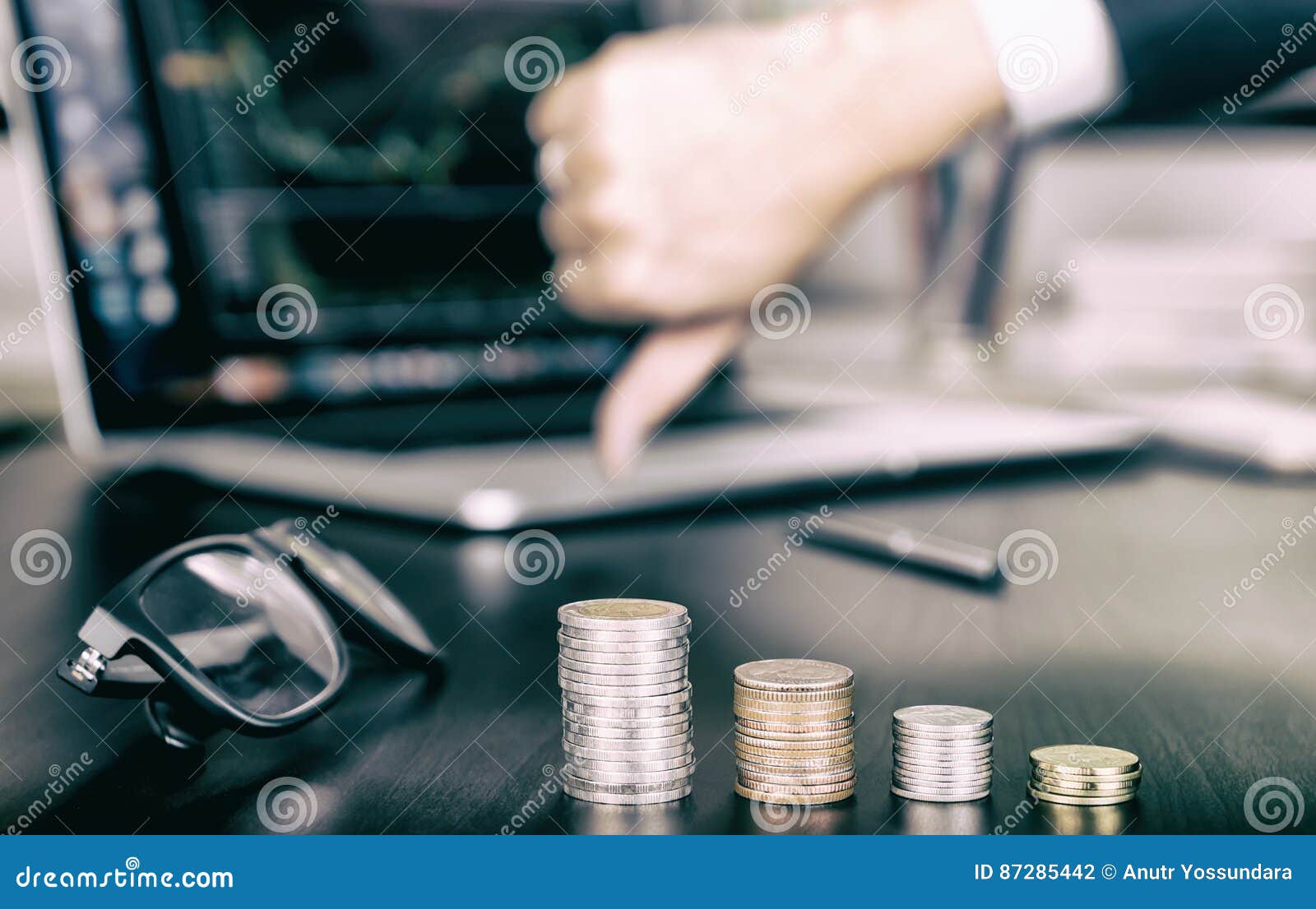 Coin Money Stack is Going Down As Stock Fail, Thumb Down Stock Photo ...