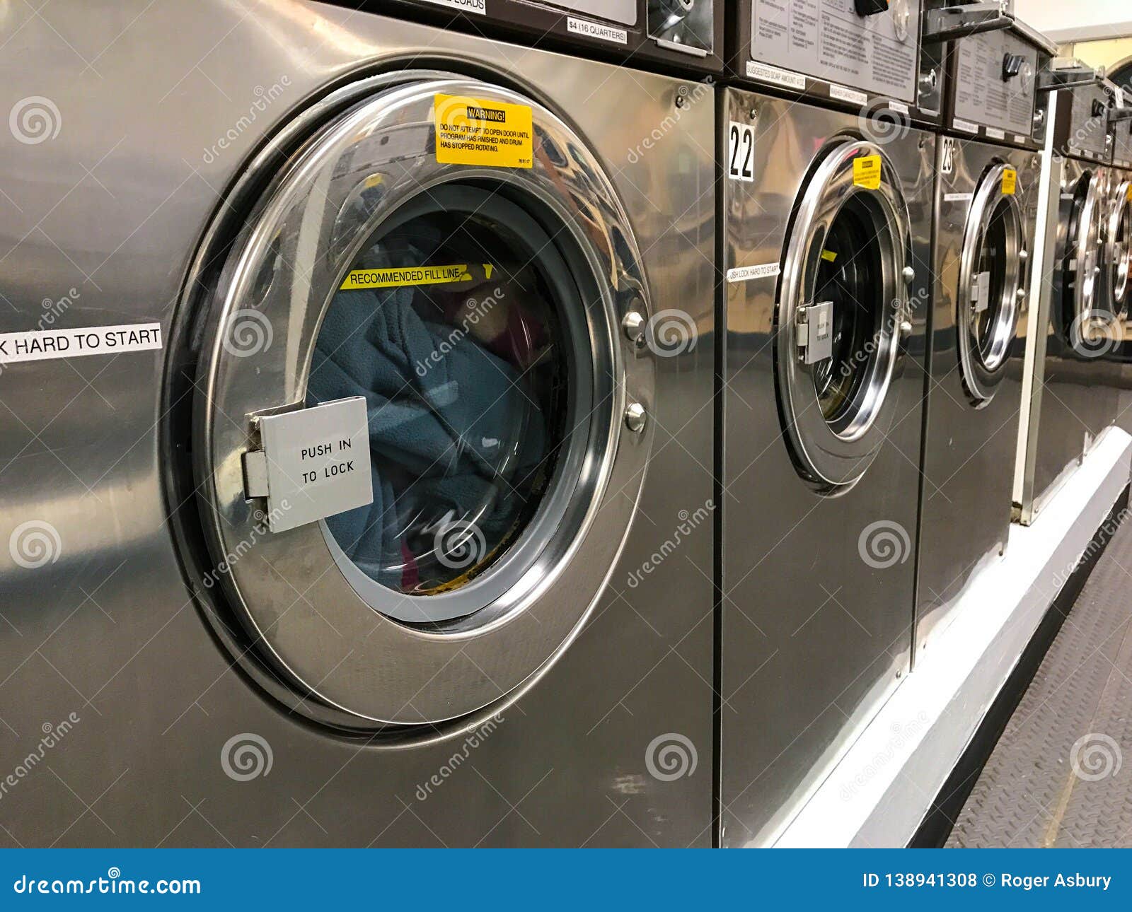 Coin-op Dryers with Laundry Stock Photo - Image of oversized, fabric ...
